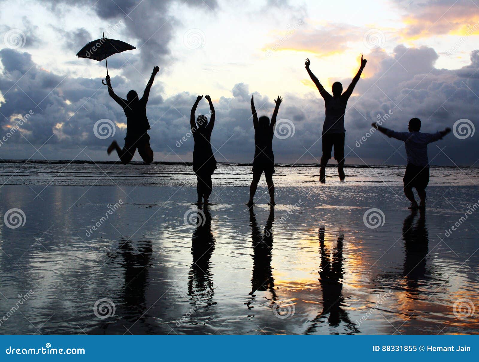 Happy friends at beach stock image. Image of dramatic - 88331855