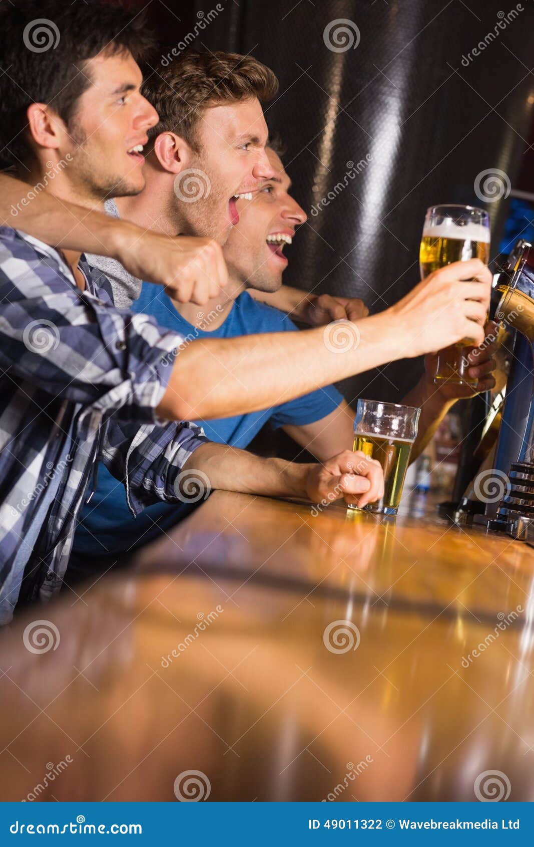 Happy Friends Catching Up Over Pints Stock Photo - Image of catchin ...