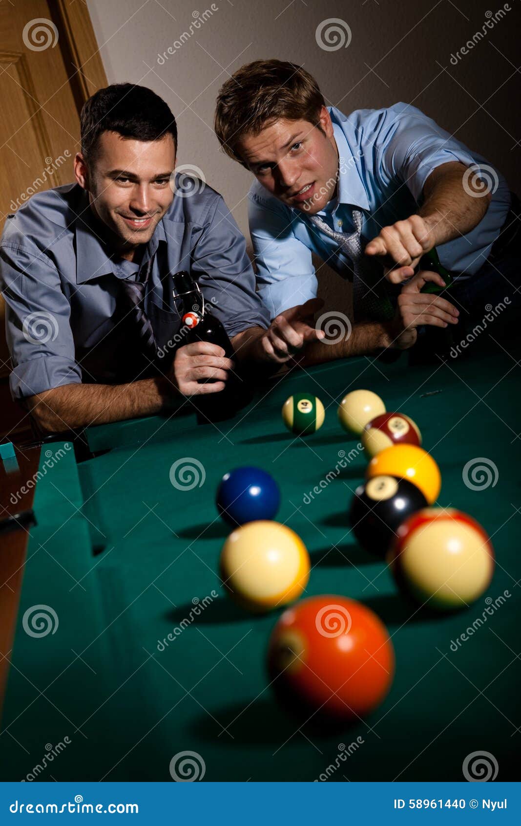 Happy Friends Discussing Game of Billiard at Table Stock Photo - Image ...