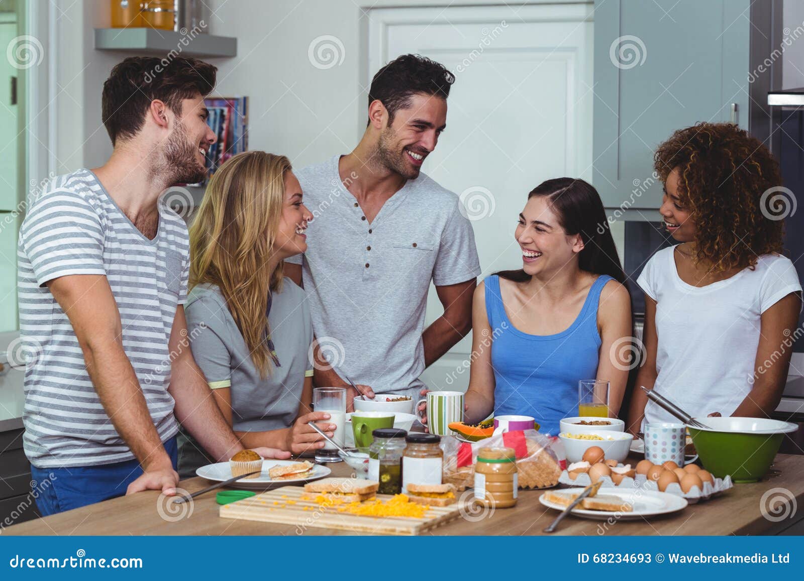 Happy Friends Discussing while Having Breakfast Stock Image - Image of ...
