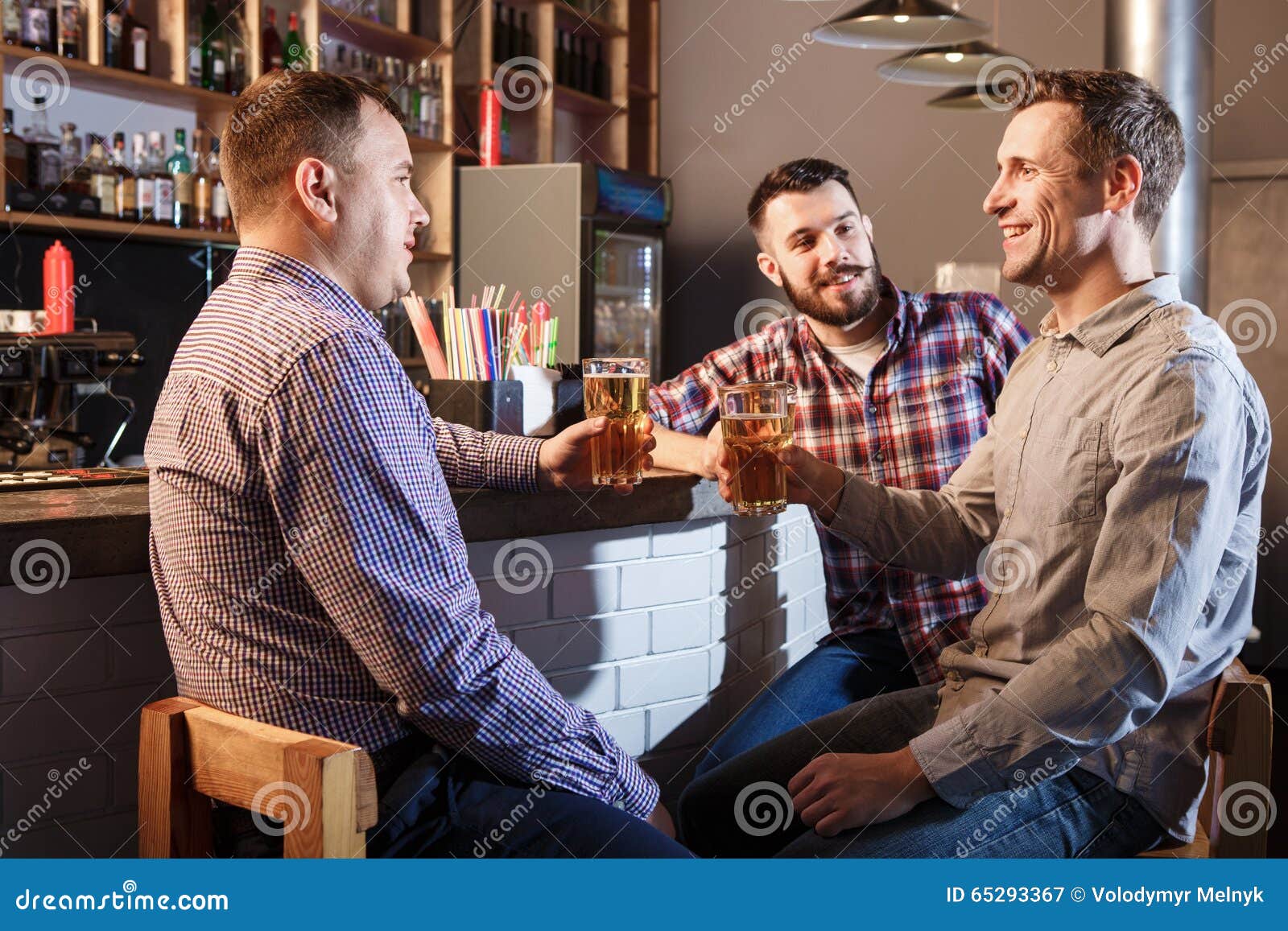 Happy Friends Drinking Beer at Counter in Pub Stock Image - Image of ...