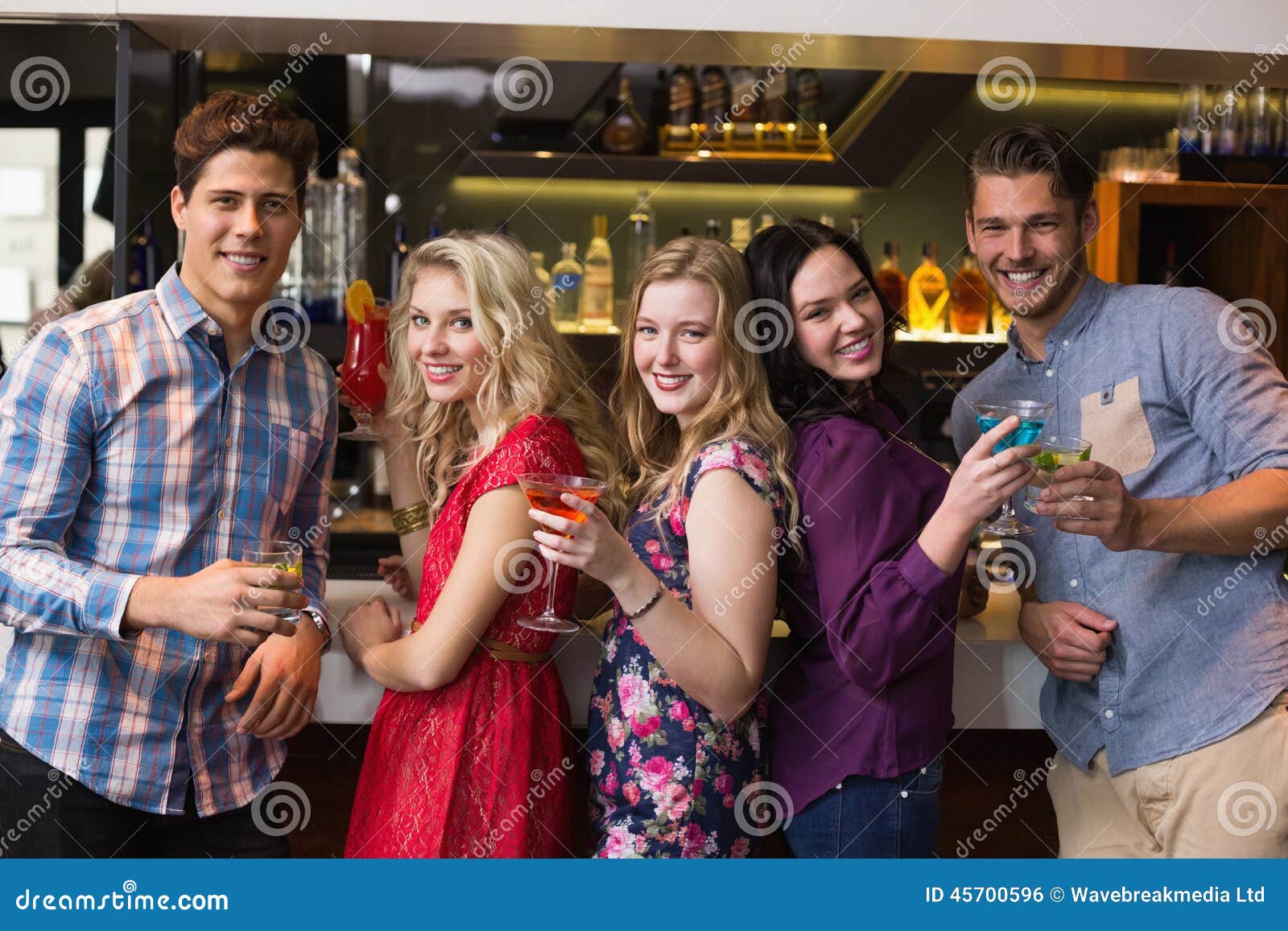Happy Friends Having a Drink Together Stock Photo - Image of meeting ...