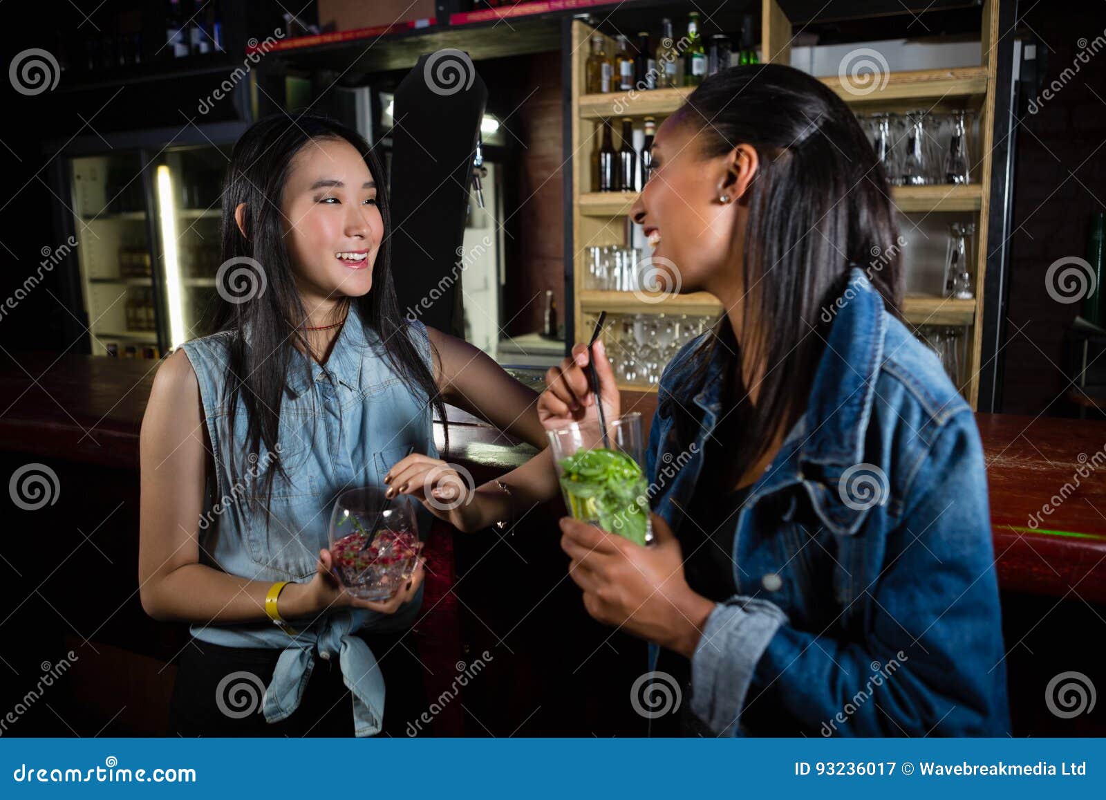 Happy Friends Interacting while Having Cocktail Stock Image - Image of ...