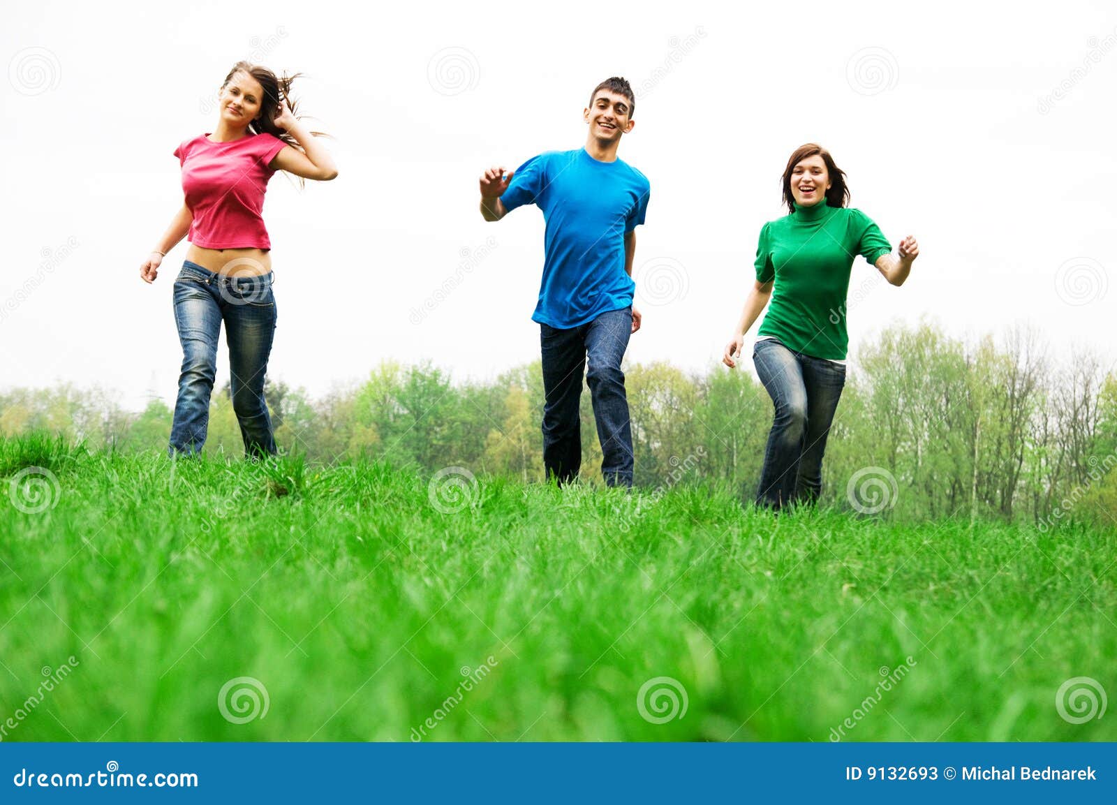 Happy friends jumping stock image. Image of attractive - 9132693