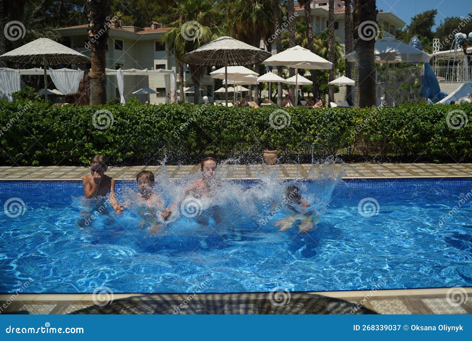 Happy Friends Jumping in Pool on the Vacations Stock Image - Image of ...