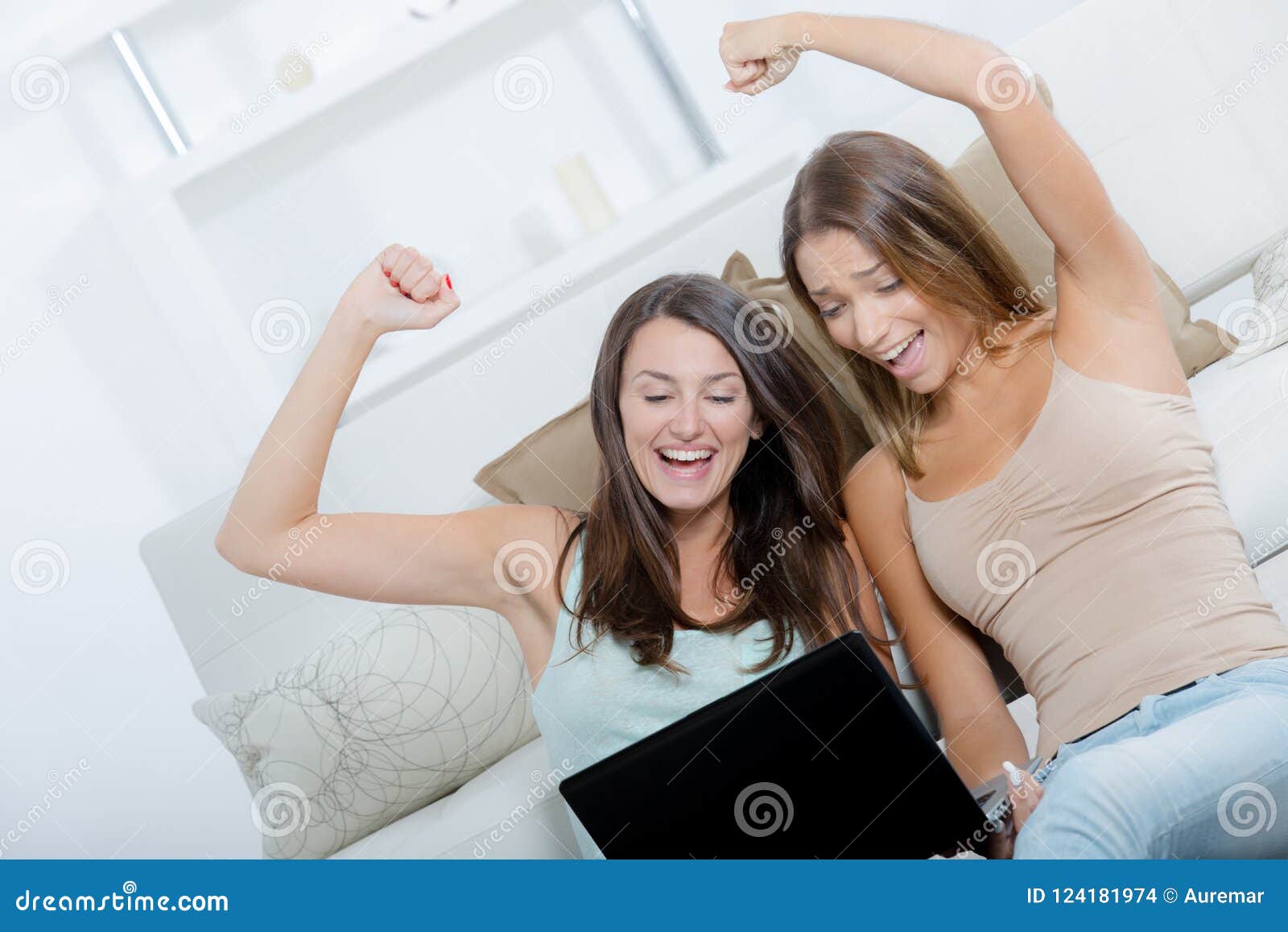 Happy friends with laptop stock photo. Image of cheerful - 124181974