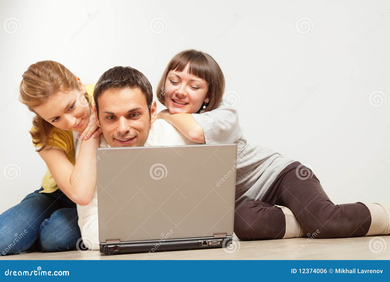 Happy Friends with Laptop Computer Stock Photo - Image of person, floor ...