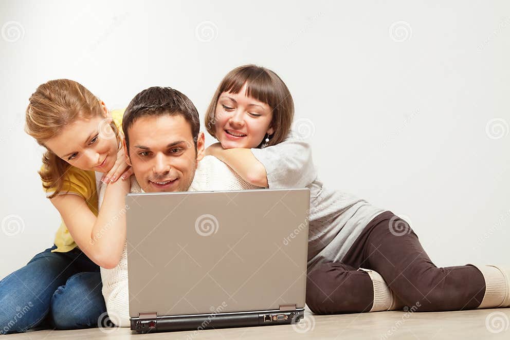Happy Friends with Laptop Computer Stock Photo - Image of person, floor ...