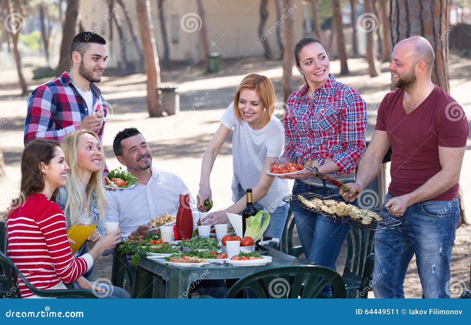 Happy friends making grill stock image. Image of friendship - 64449511