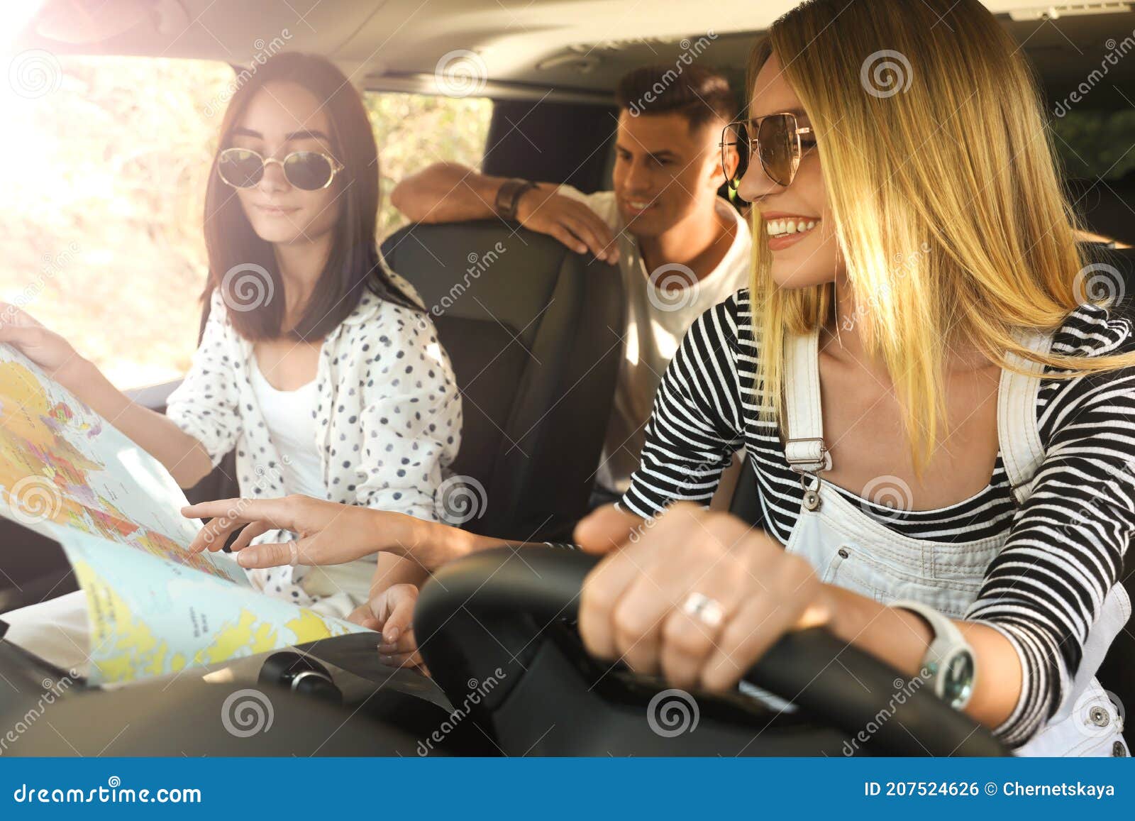 Happy Friends with Map in Car on Road Trip Stock Photo - Image of ...