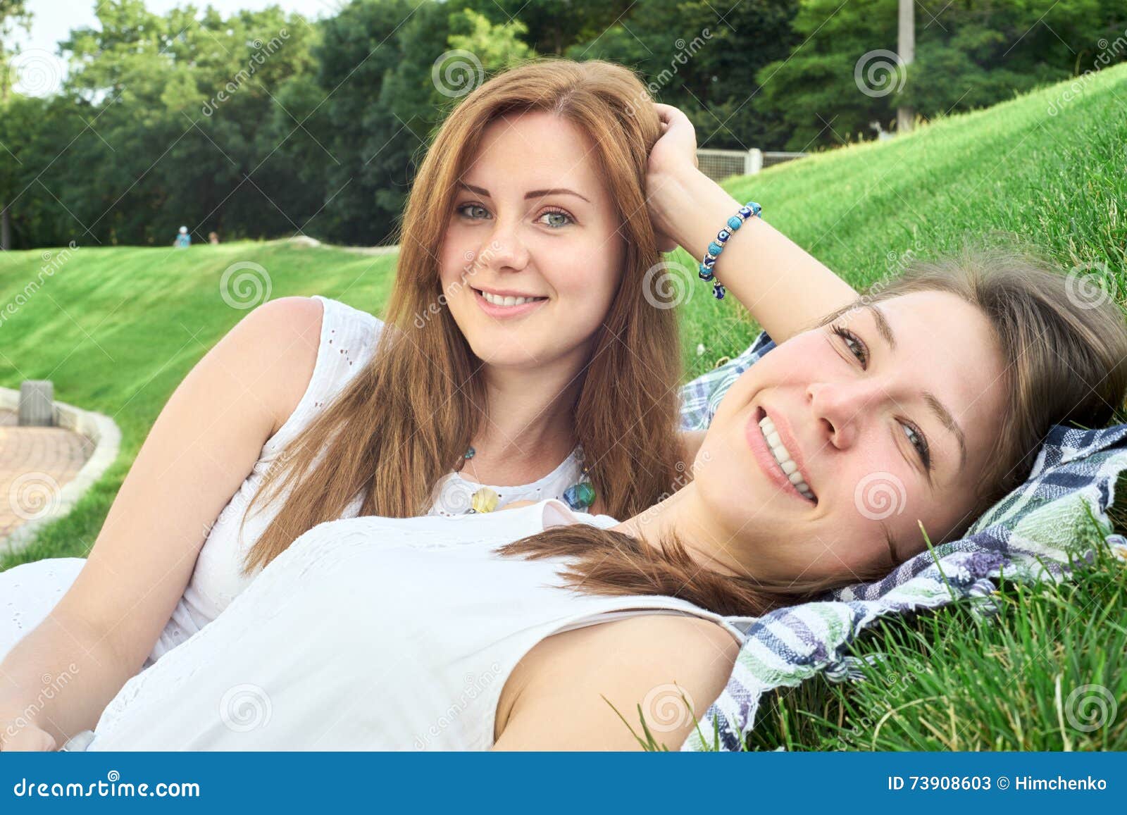 Happy friends in the park stock image. Image of conversation - 73908603