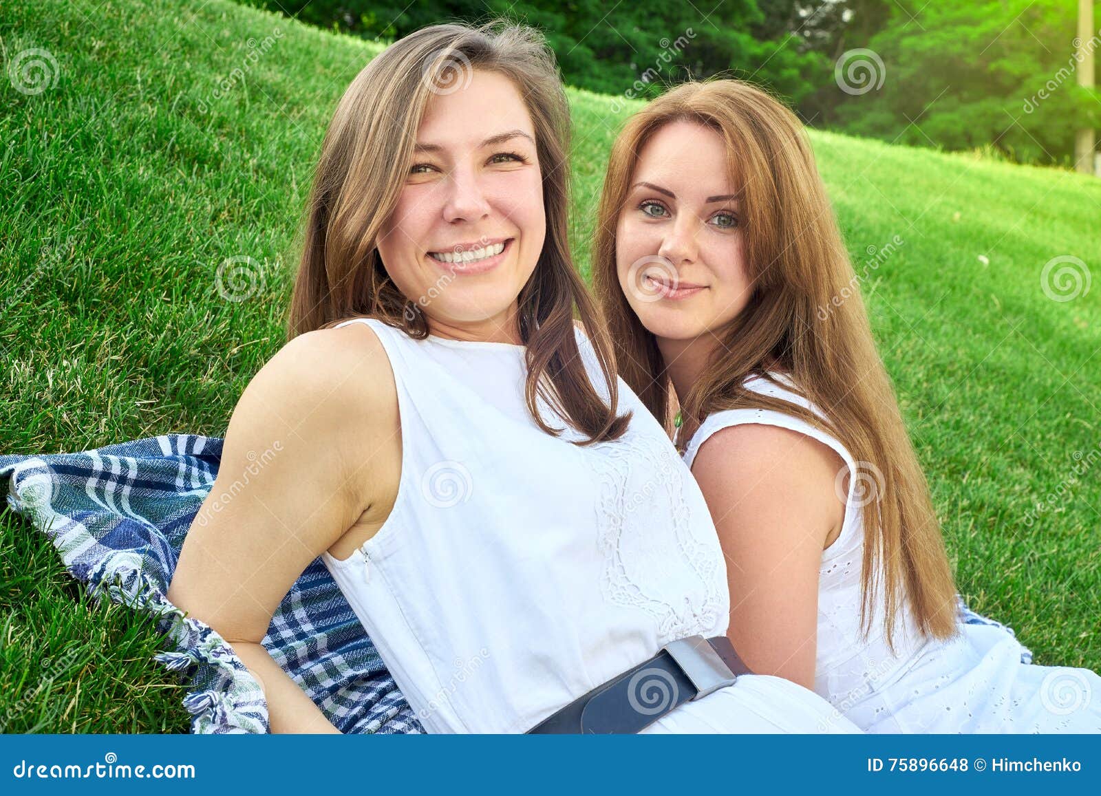 Happy friends in the park stock photo. Image of beautiful - 75896648