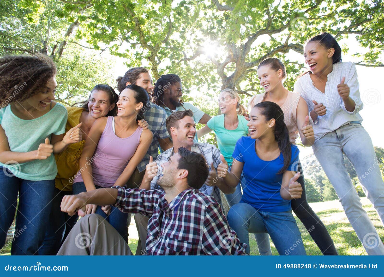 Happy friends in the park stock photo. Image of large - 49888248
