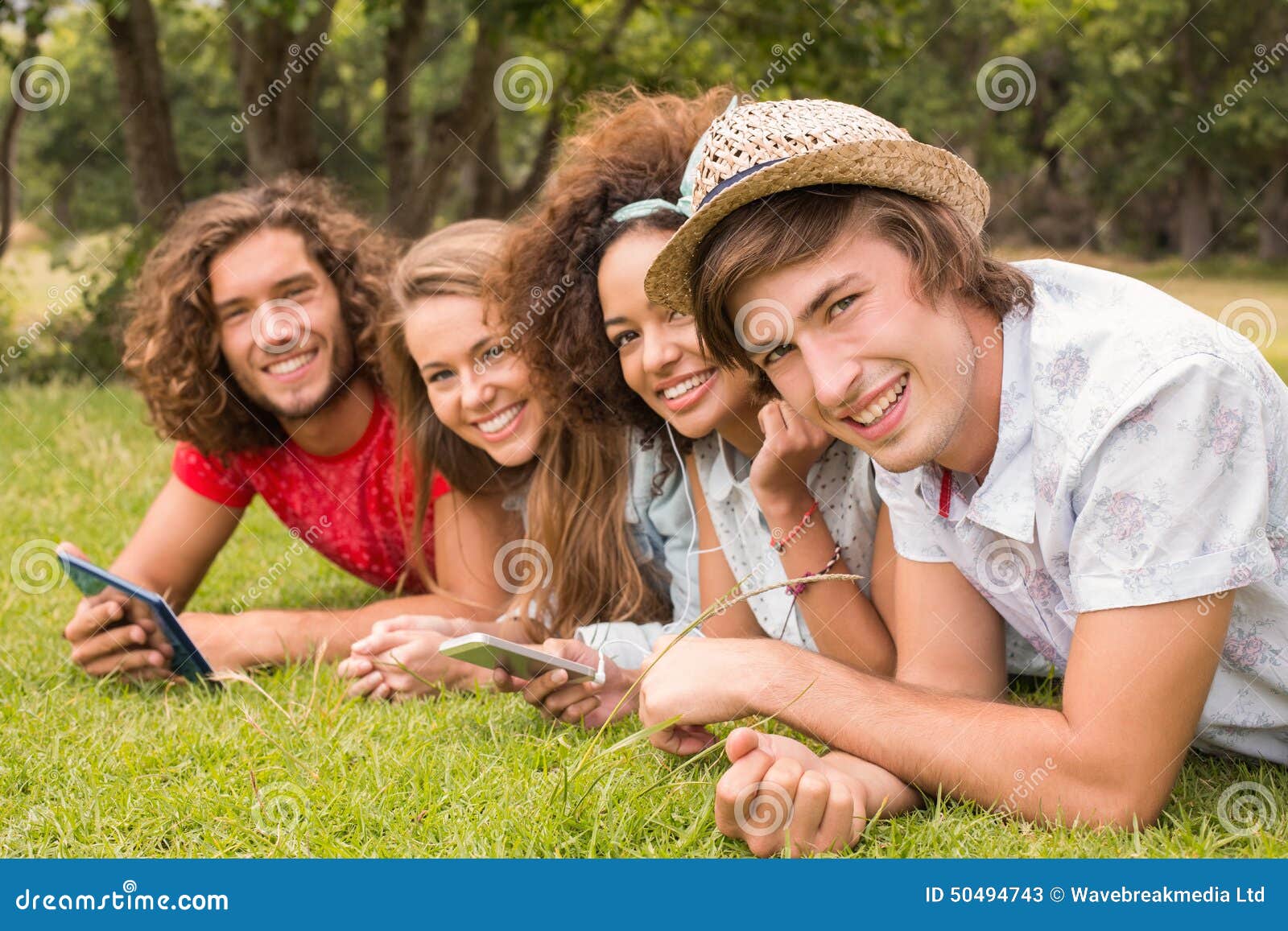 Happy friends in the park stock image. Image of activities - 50494743