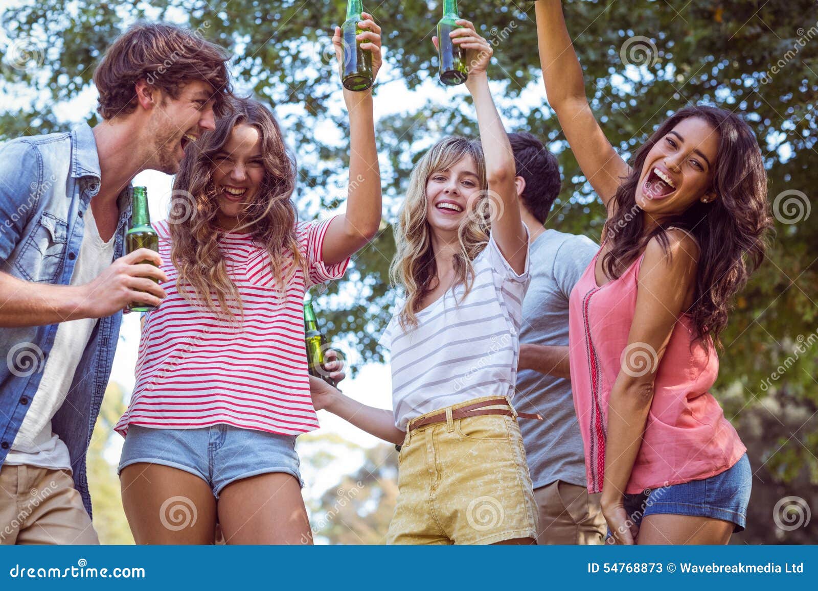 Happy friends in the park stock image. Image of friendliness - 54768873