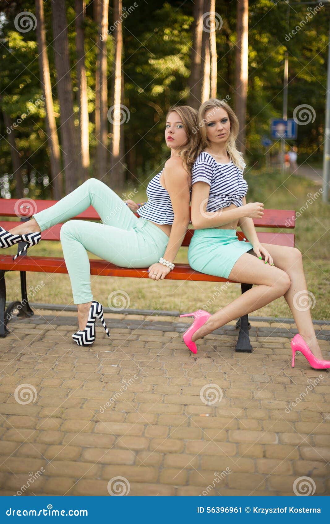 Happy friends in the park stock image. Image of water - 56396961