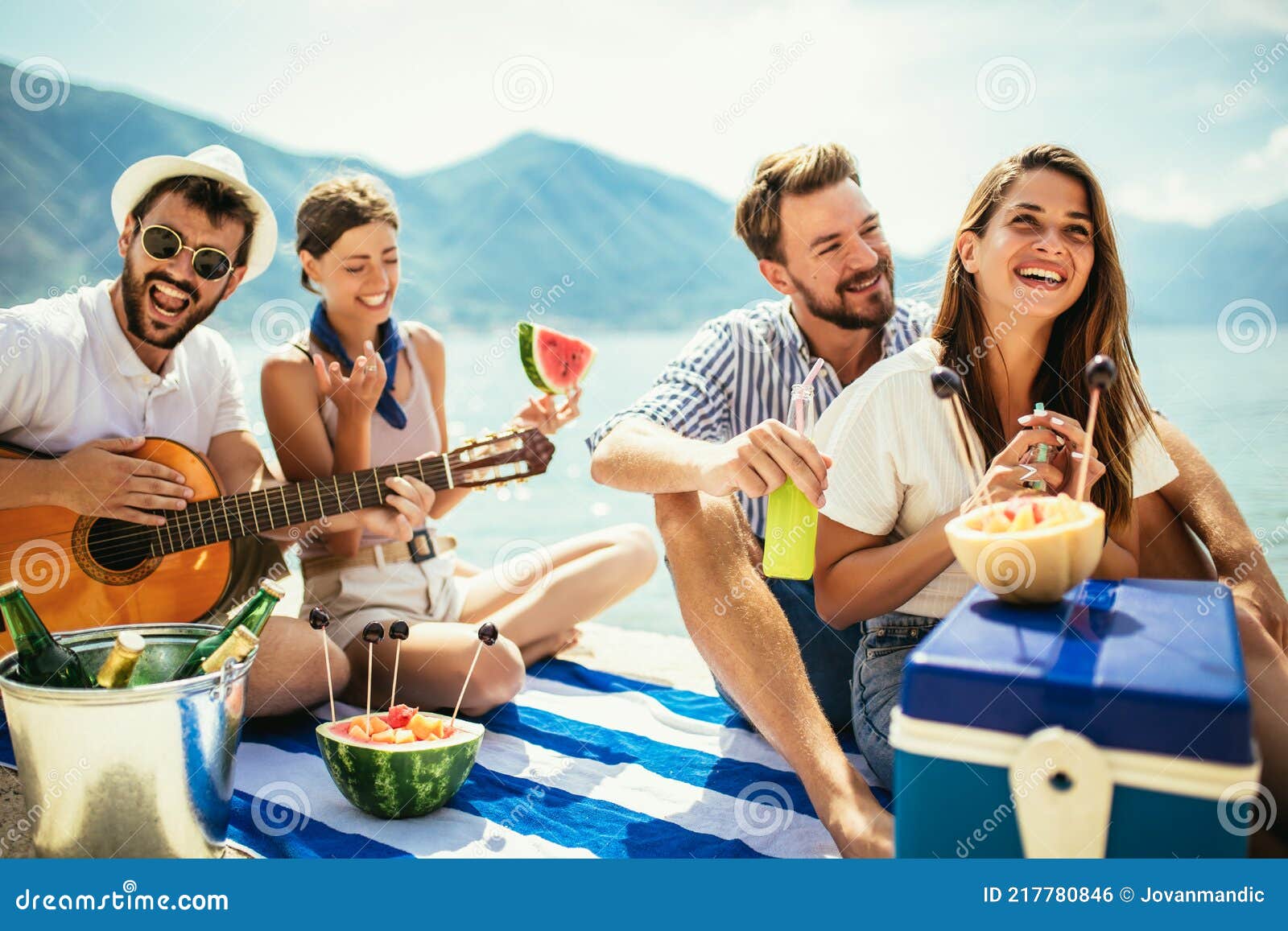 Friends Partying on the Beach with Drinks Stock Photo - Image of female ...