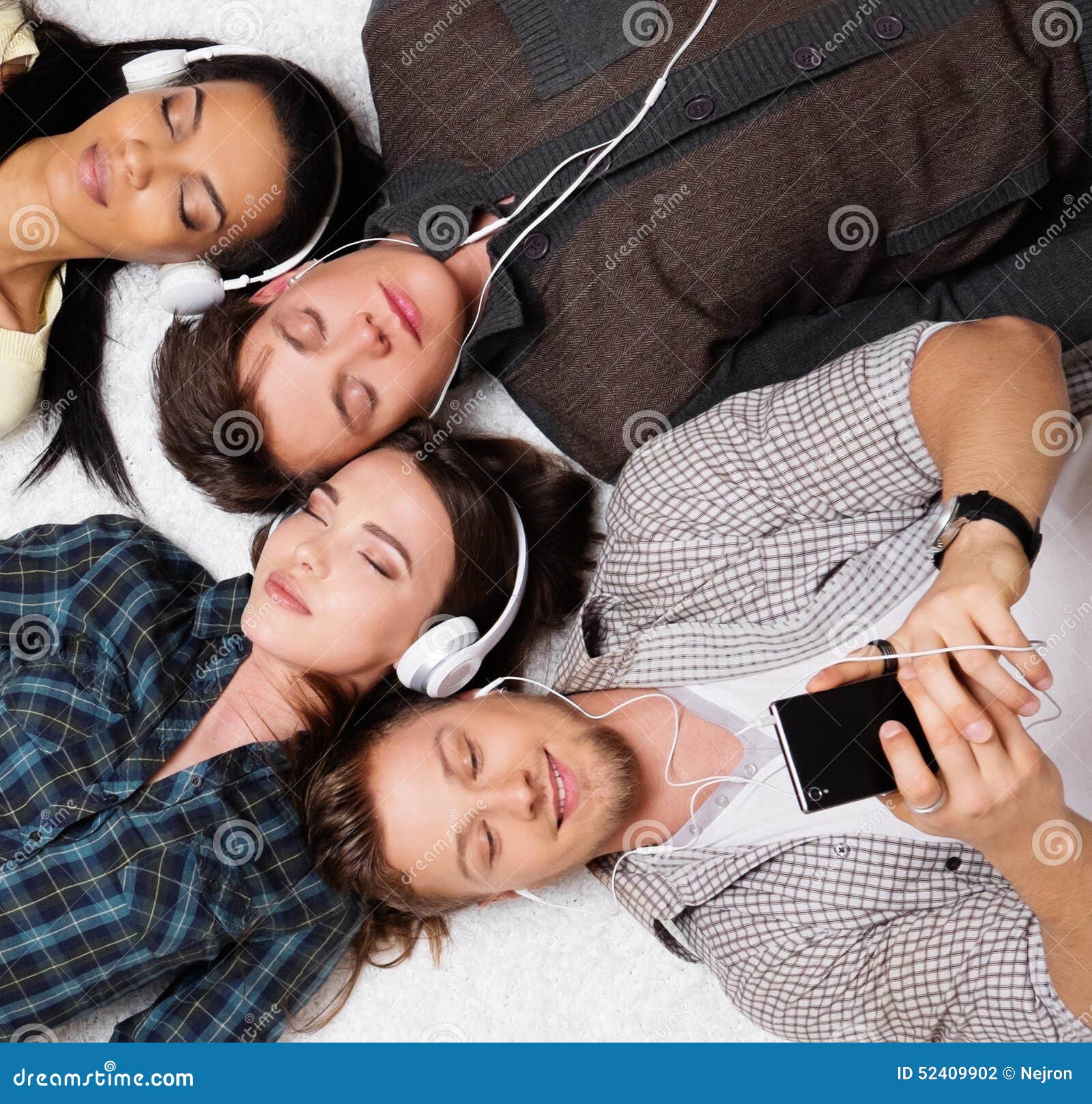 Happy Friends Relaxing with Gadgets Stock Photo - Image of carpet ...