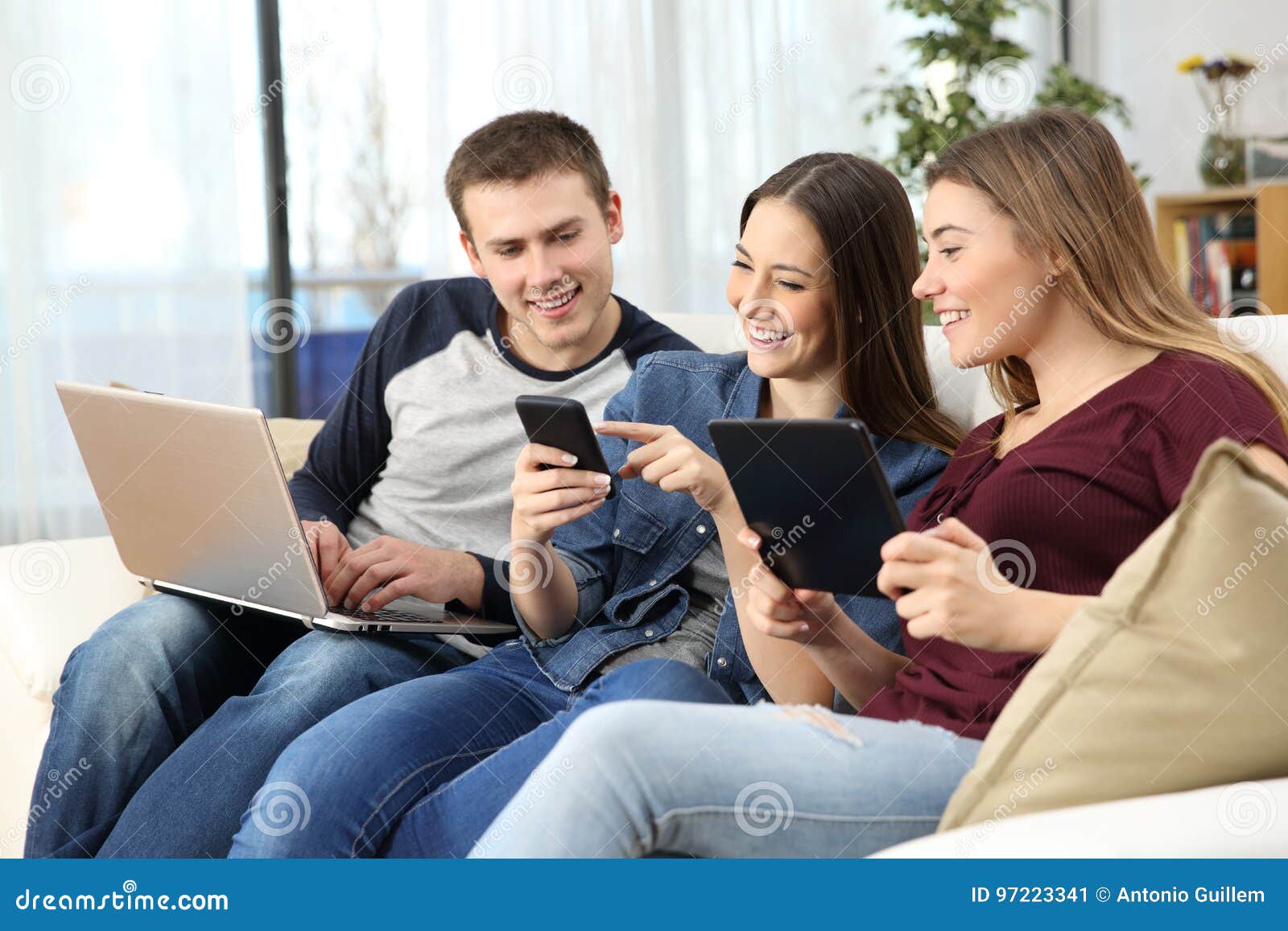 Happy Friends Sharing on Line Content at Home Stock Image - Image of ...