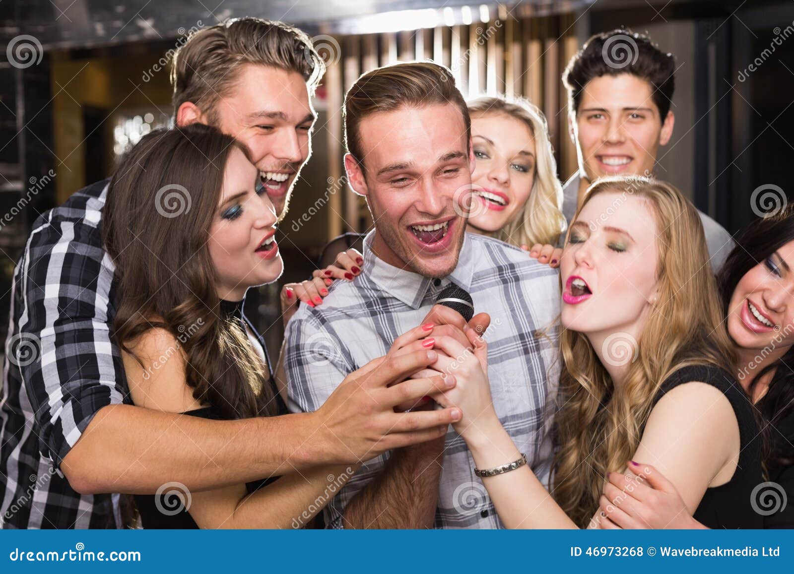 Happy Friends Singing Karaoke Together Stock Photo - Image of cheerful ...