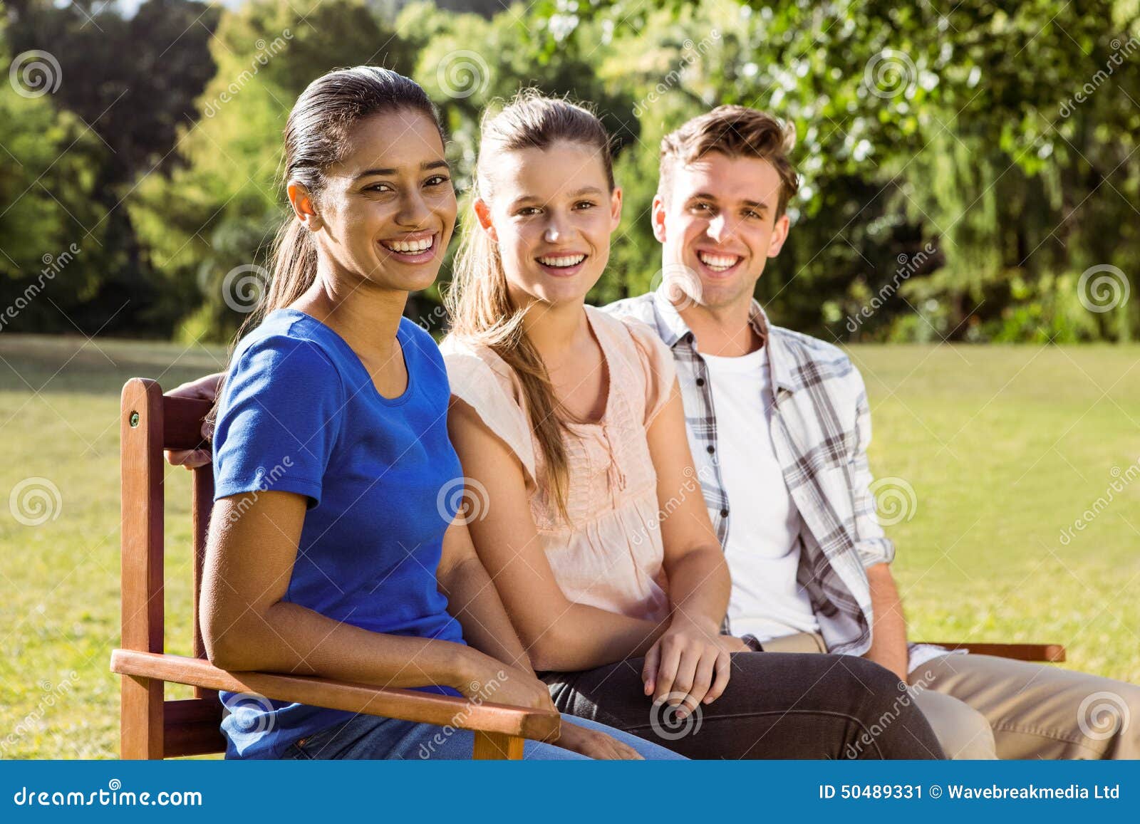 Happy Friends Sitting on Bench Stock Image - Image of knowledge ...