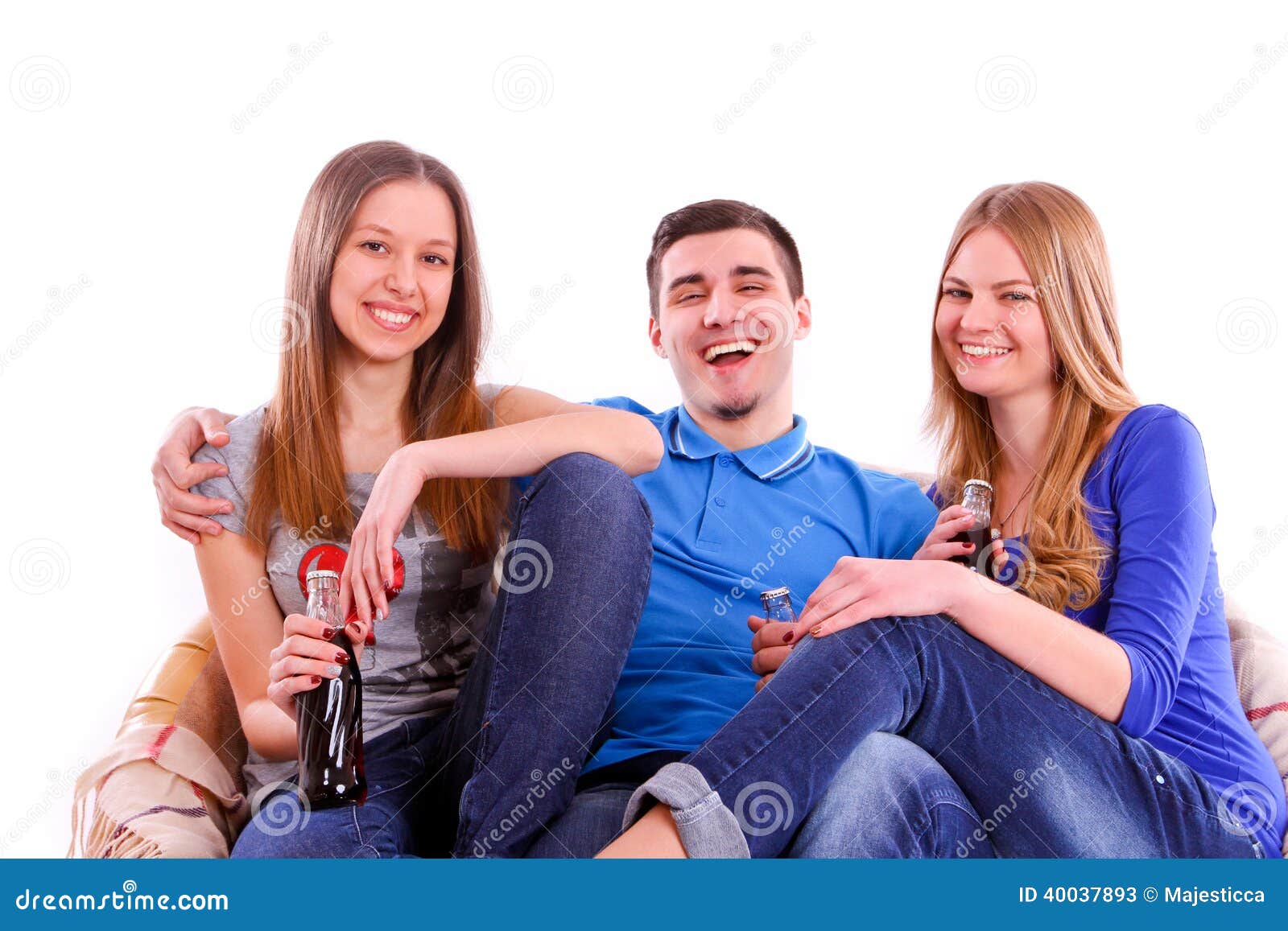 Happy Friends Sitting on Sofa and Drinking Soda Stock Image - Image of ...