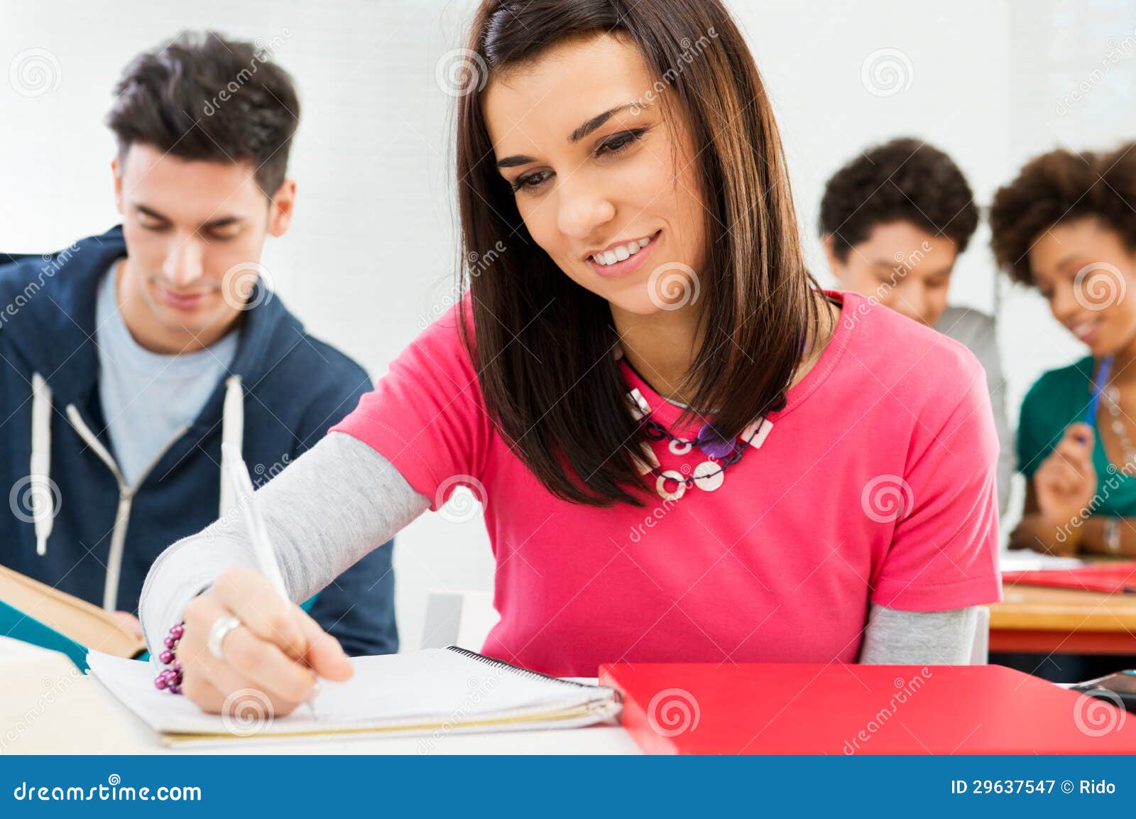 Happy Friends Studying stock image. Image of library - 29637547