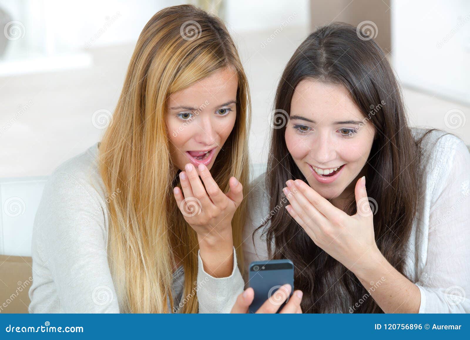 Happy Friends Using Mobile Phone Stock Photo - Image of lifestyle, city ...