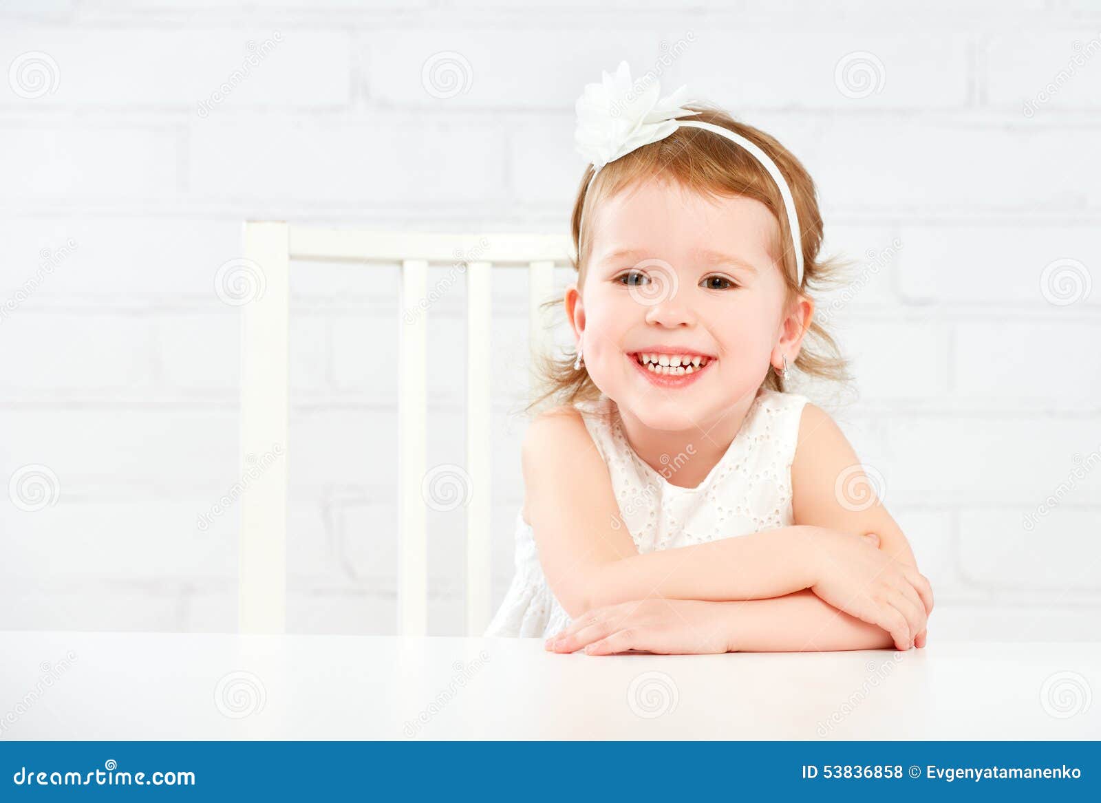 Happy Fun Funny Girl Child Laughing at Empty White Table Stock Photo ...