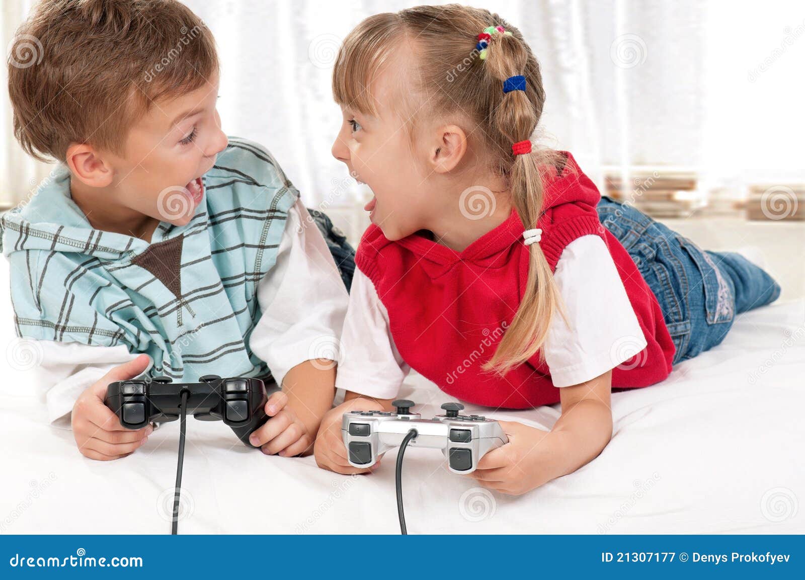 Happy Girl and Boy Playing a Video Game Stock Image - Image of male ...