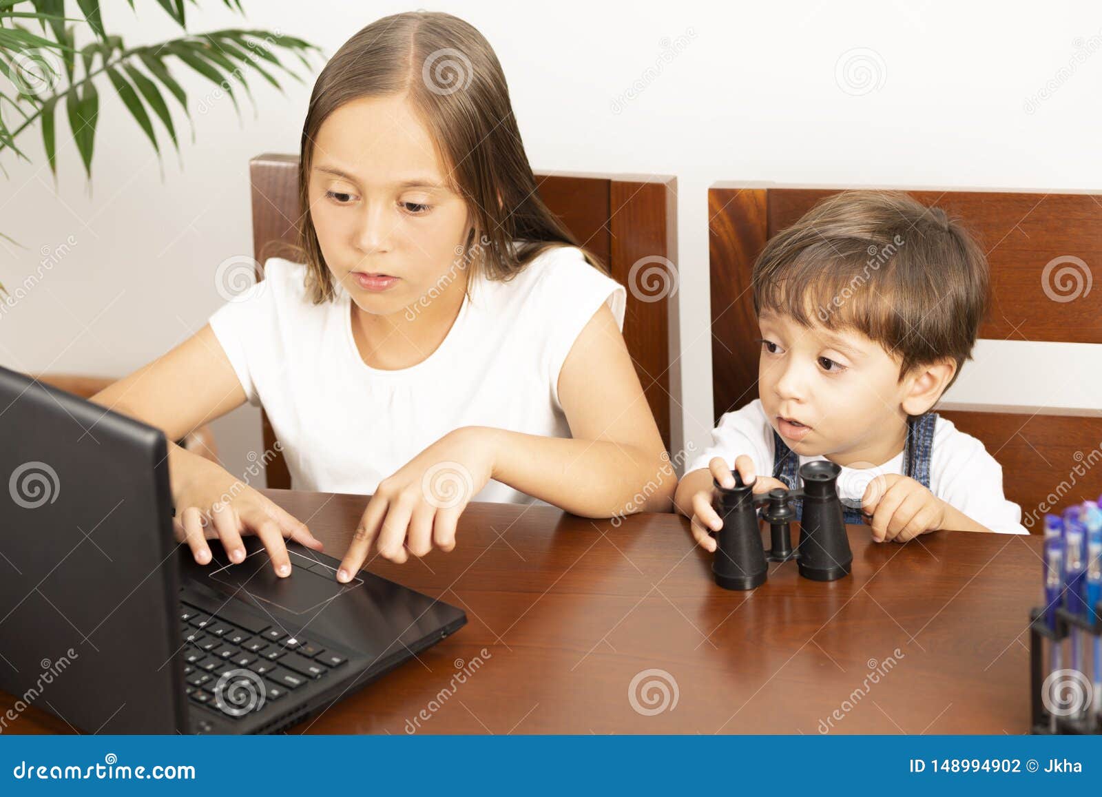 Happy Girl and Boy Using Laptop Stock Photo - Image of child, game ...