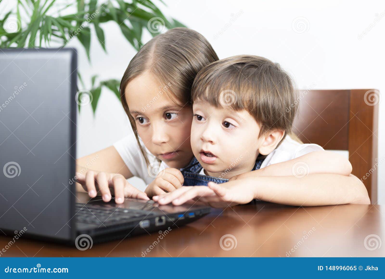 Happy Girl and Boy Using Laptop Stock Image - Image of girl, desktop ...