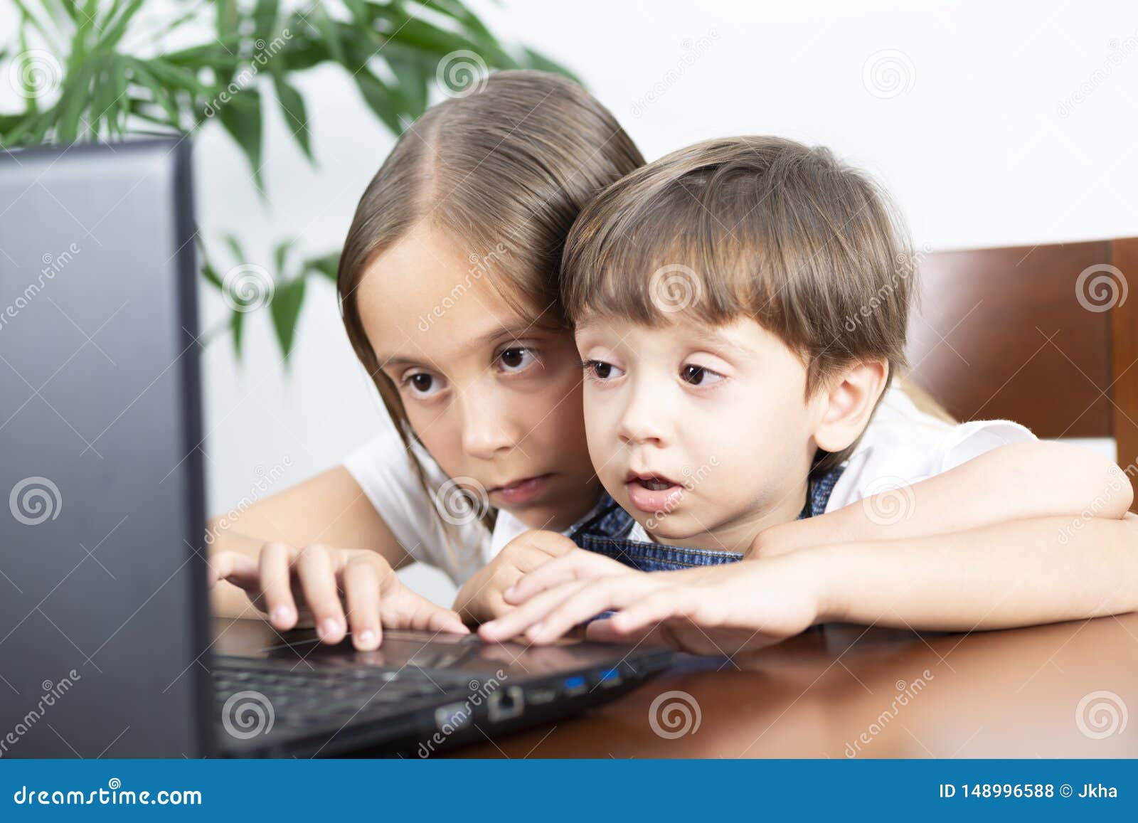Happy Girl and Boy Using Laptop Stock Photo - Image of lifestyle, kids ...