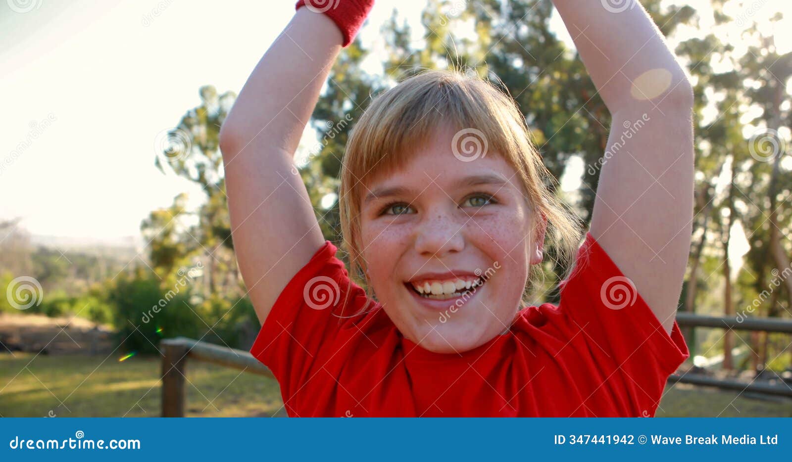 Happy Girl Cheering in Boot Camp during Obstacle Course Stock Photo ...