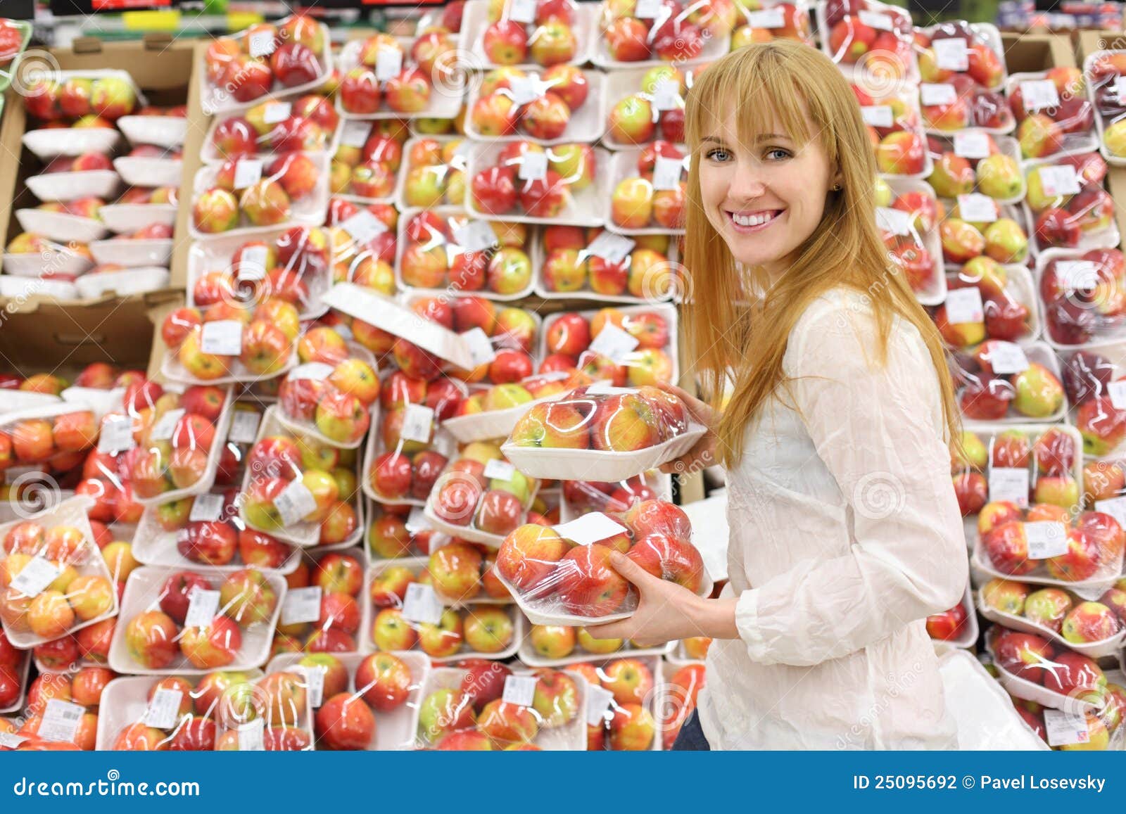 Happy Girl Chooses Packed Apples in Store Stock Photo - Image of market ...