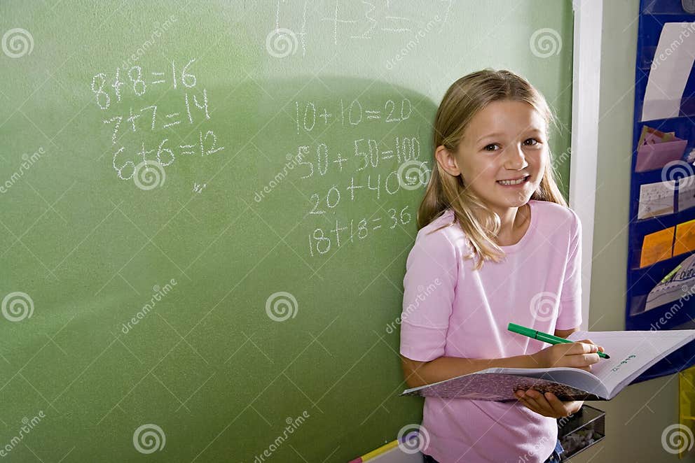 Happy Girl Doing Math on Blackboard in Class Stock Image - Image of ...
