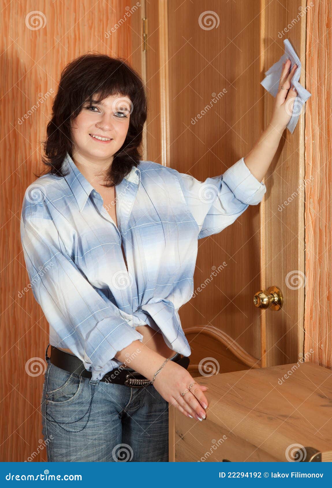 Happy girl dusting at home stock photo. Image of chores - 22294192