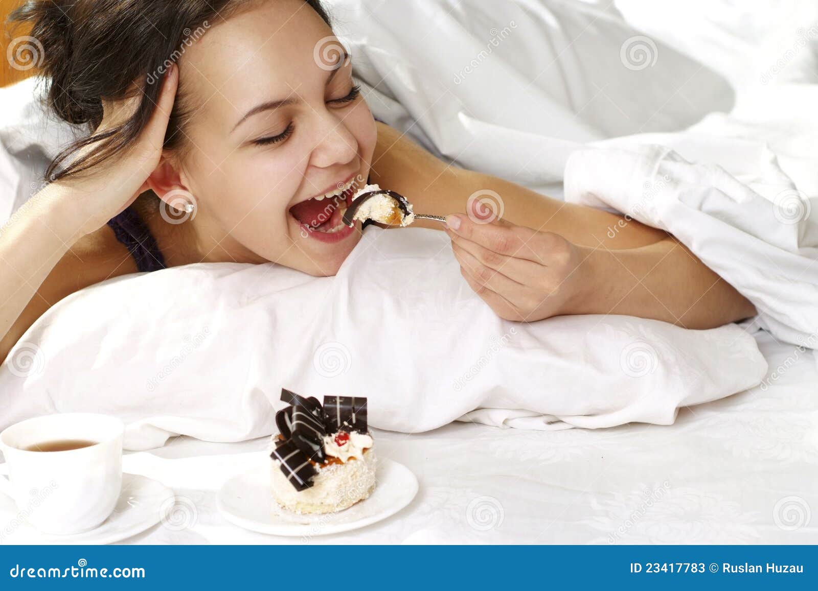 Happy girl eating cake stock image. Image of modern, coverlet - 23417783
