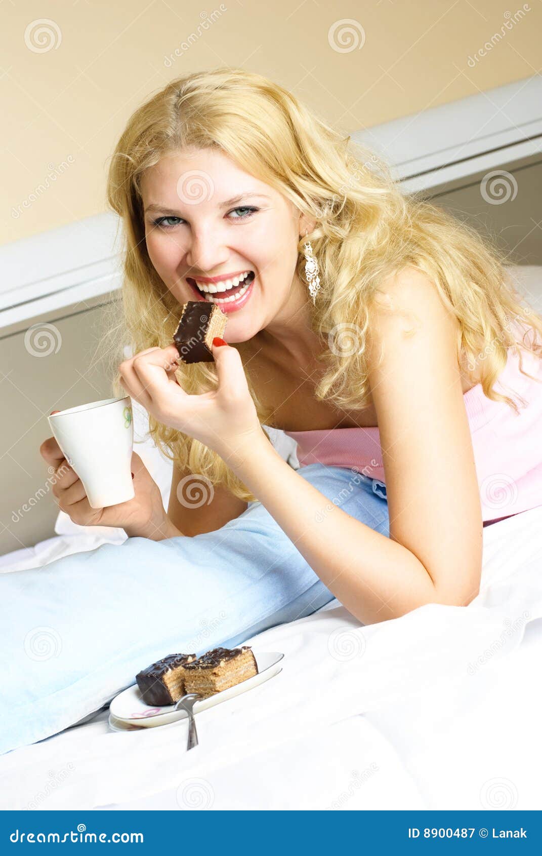 Happy girl eating a cake stock image. Image of happy, pleasure - 8900487