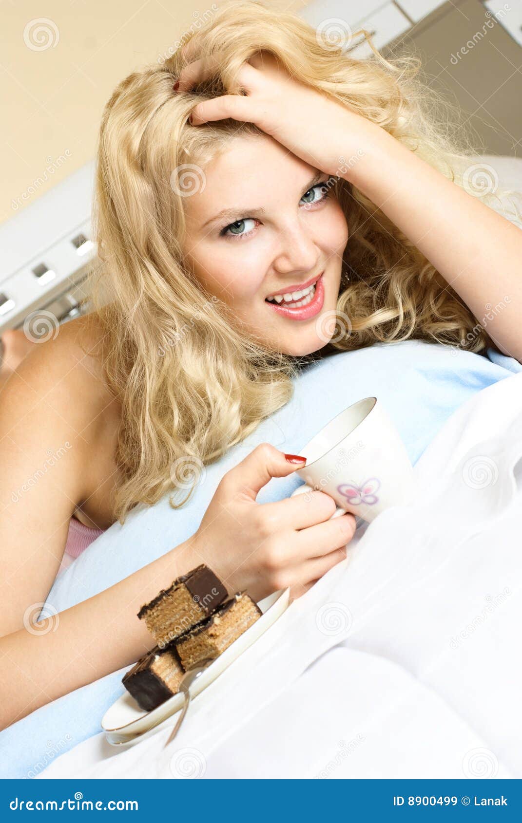 Happy girl eating a cake stock image. Image of pretty - 8900499