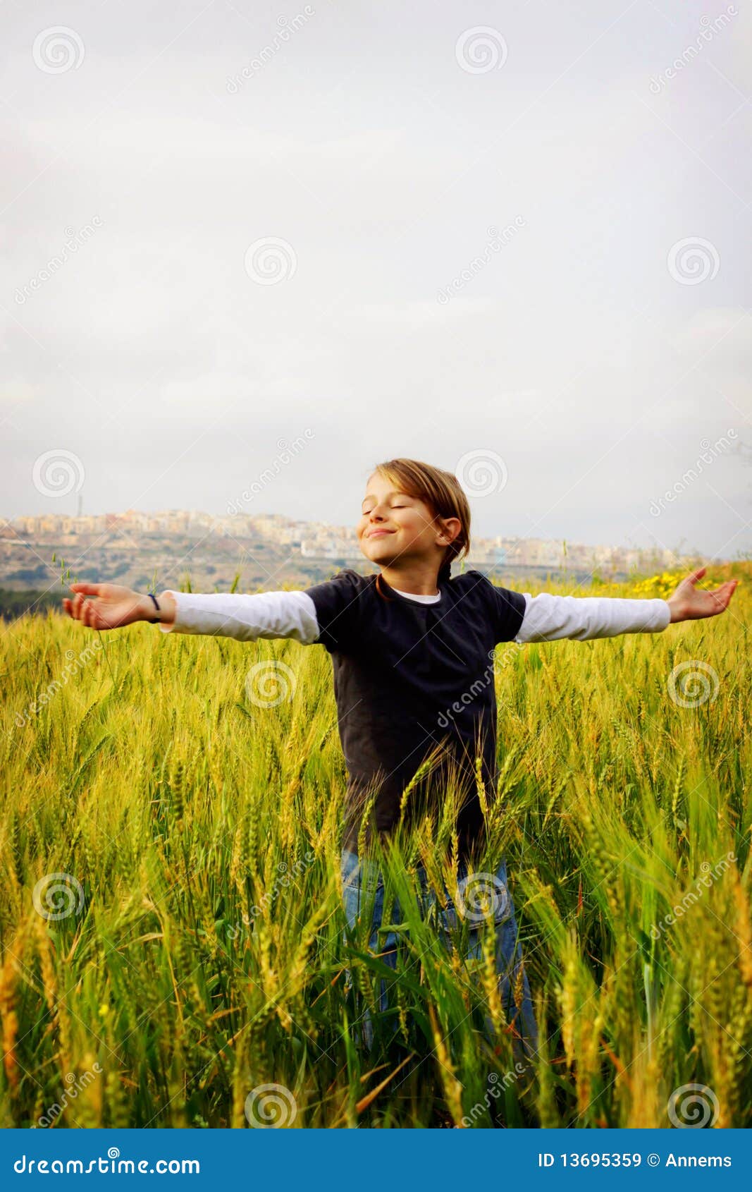 Happy girl in a field stock image. Image of mindful, elated - 13695359