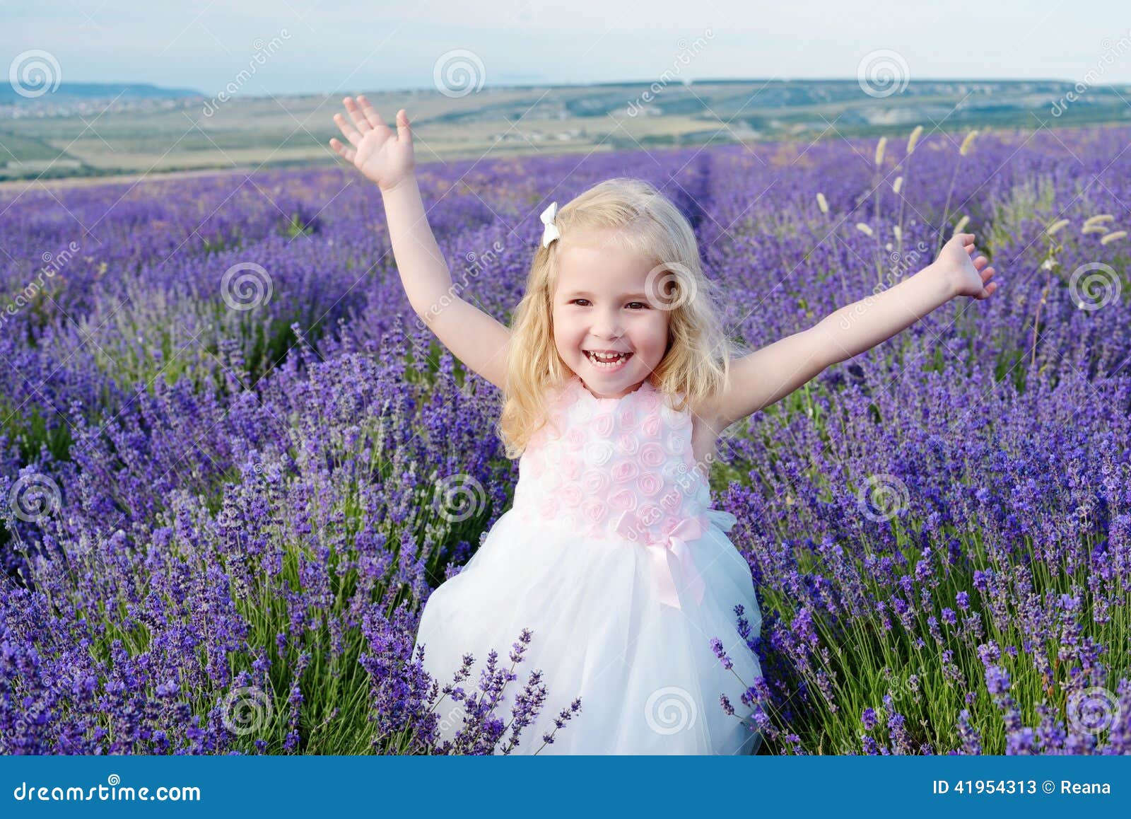 Happy girl in field stock image. Image of childcare, field - 41954313