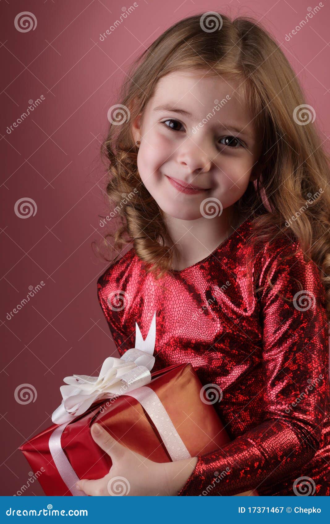 Happy girl with gift box stock image. Image of girl, living - 17371467