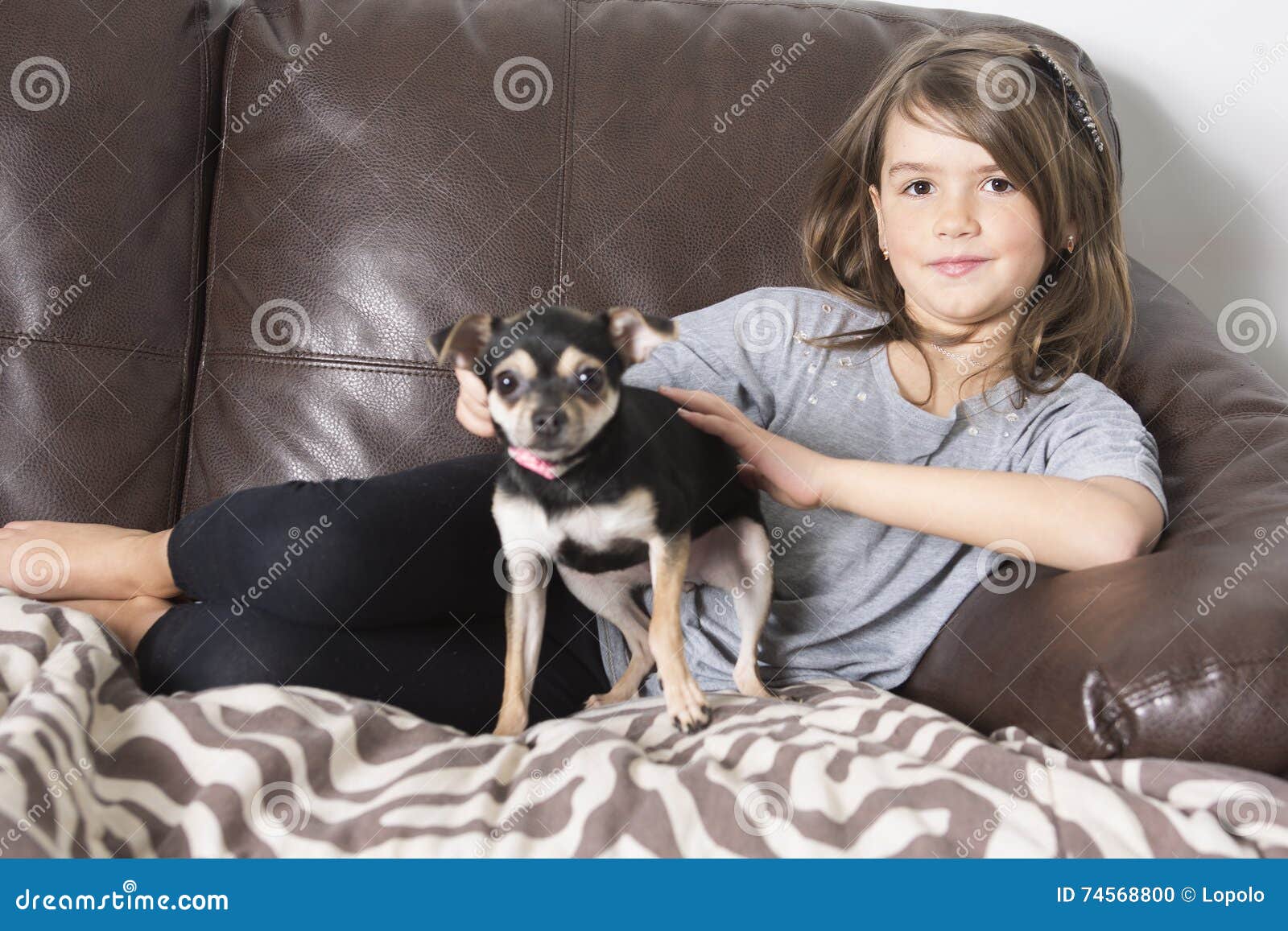 Happy Girl with His Dog on Sofa Stock Photo - Image of funny, cozy ...