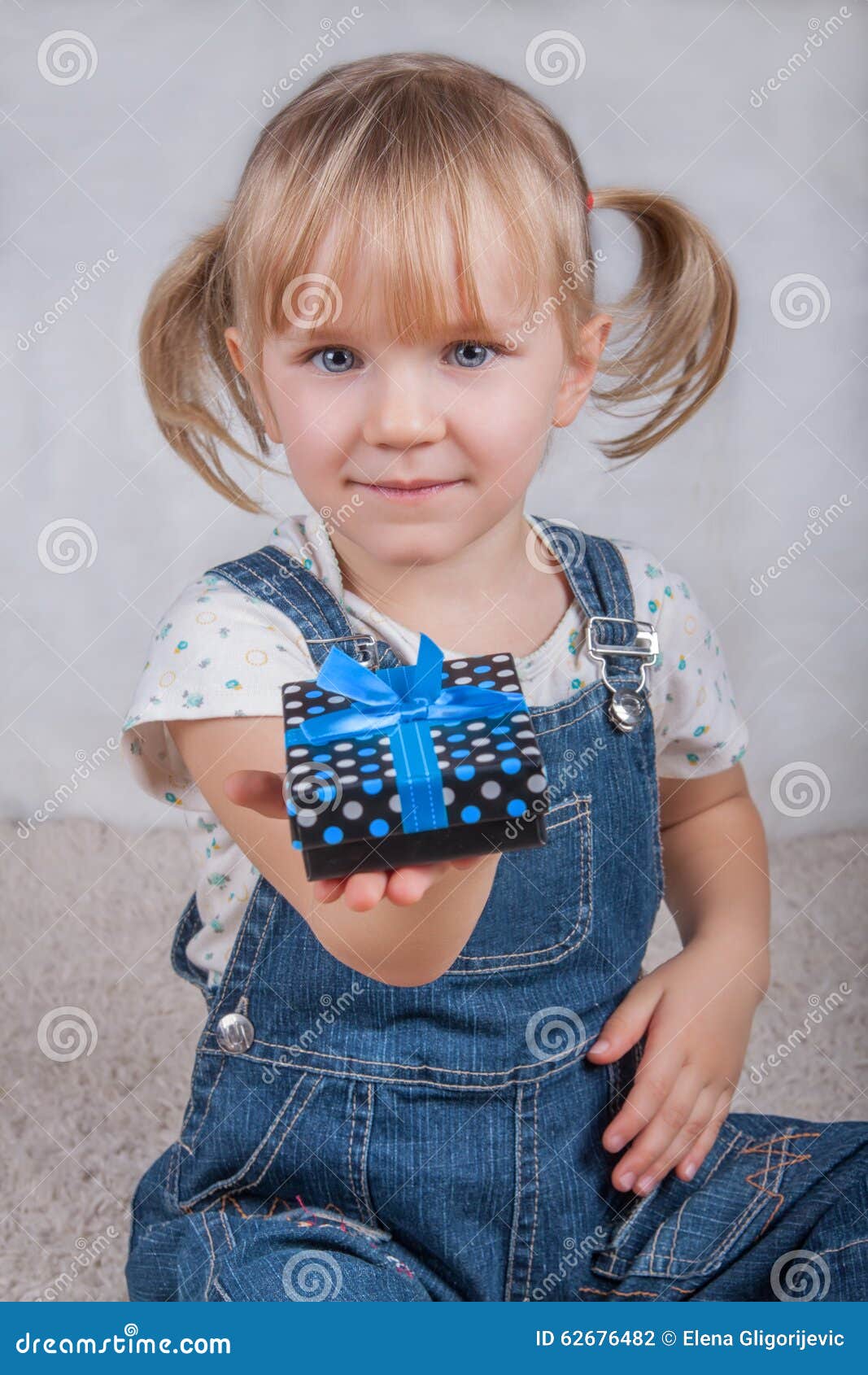 Happy Girl Holds a Gift Box in Hand Stock Photo - Image of child, event ...