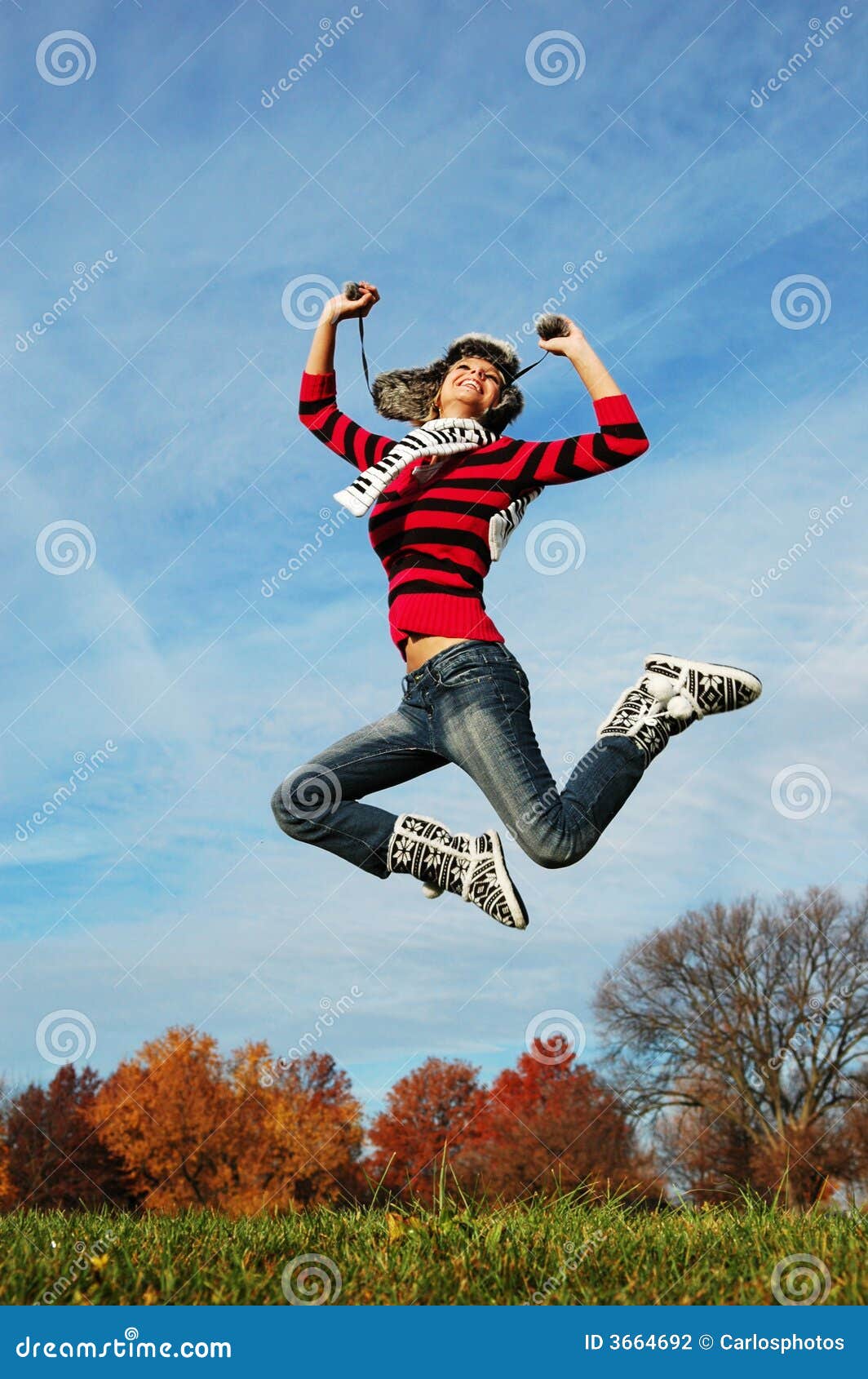 Happy girl jumping of joy stock photo. Image of high, active - 3664692