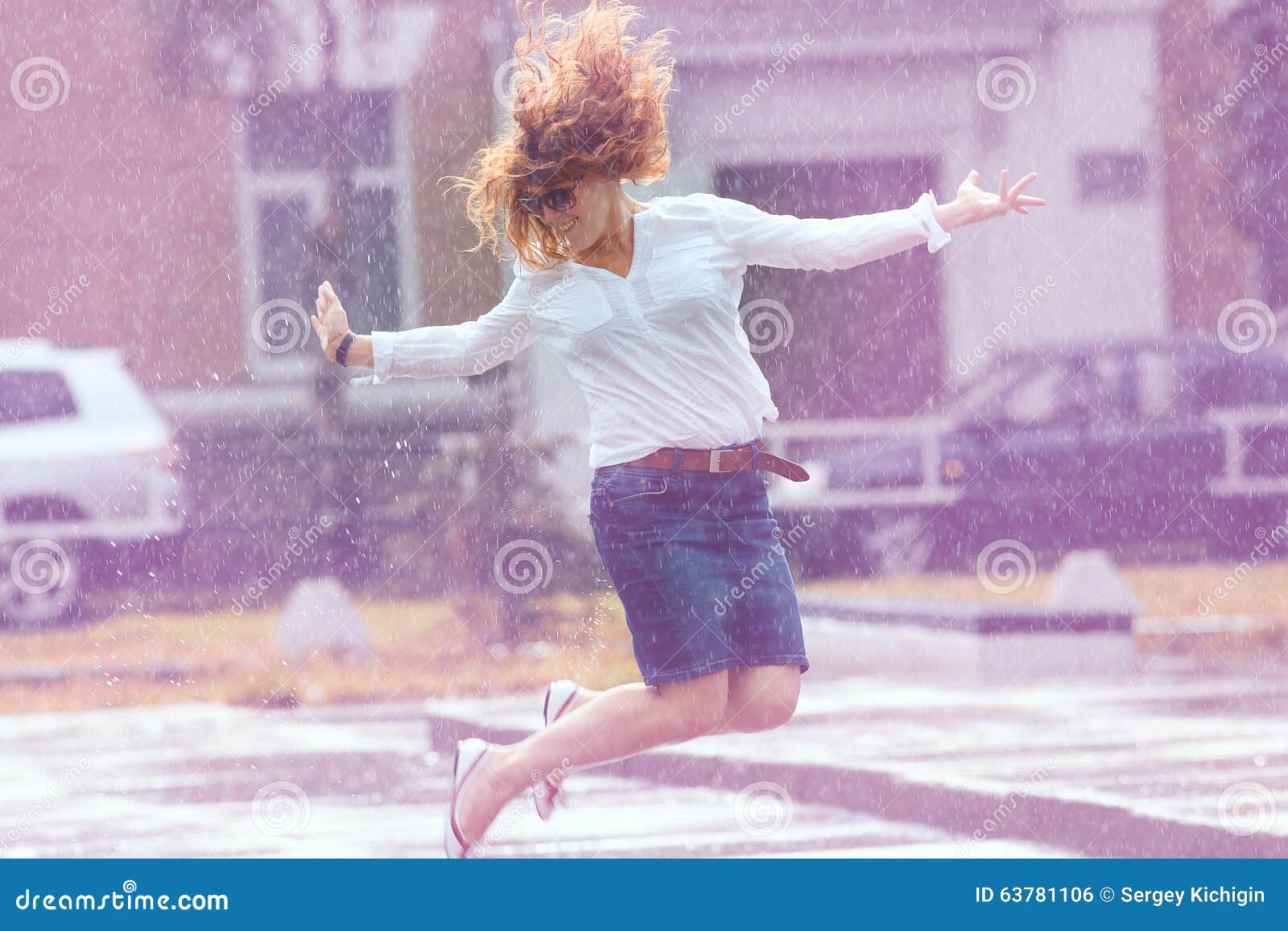 Happy Girl Jumping in Puddle Stock Photo - Image of girl, autumn: 63781106