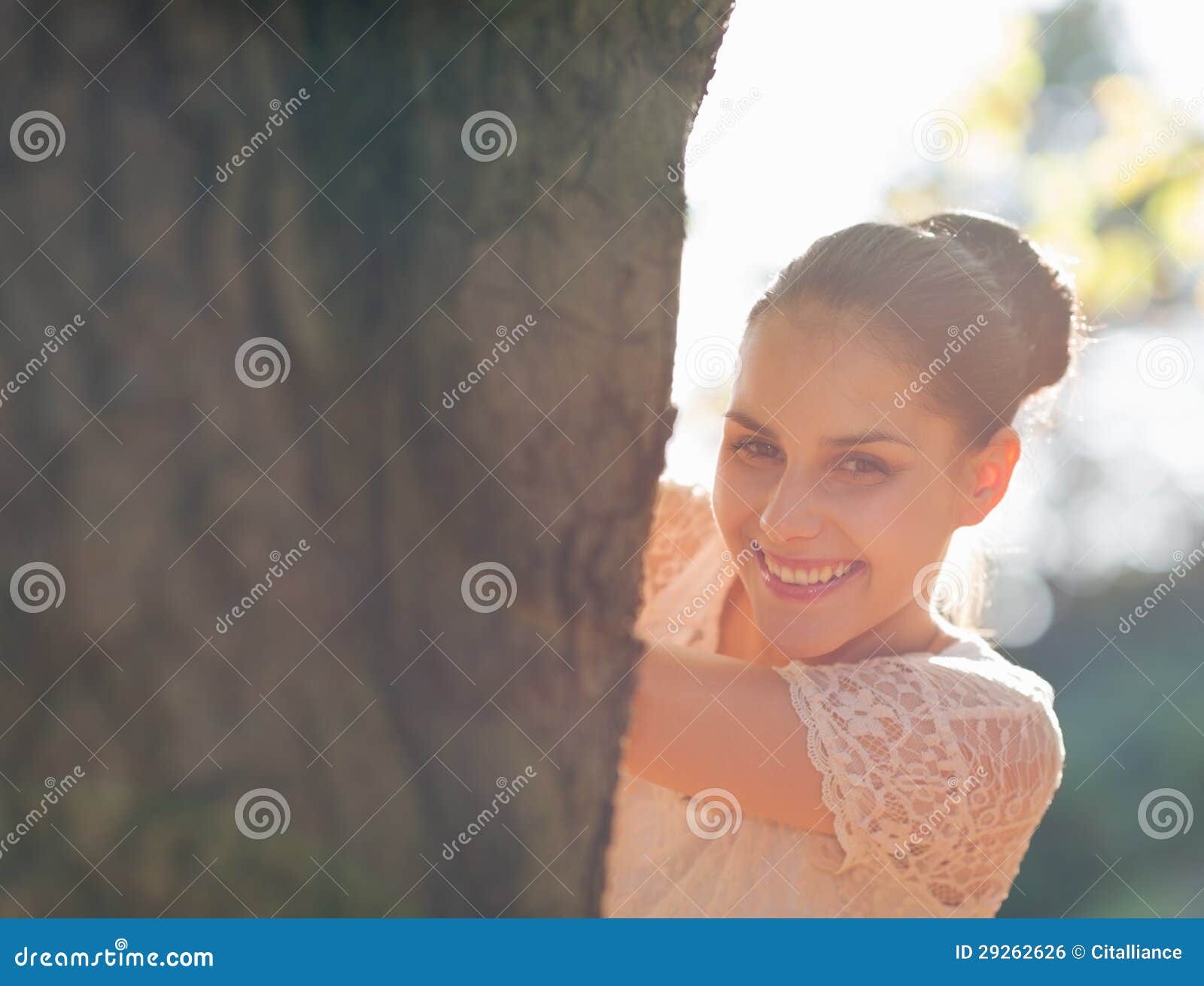 Happy Girl Looking Out from Tree Stock Photo - Image of female ...