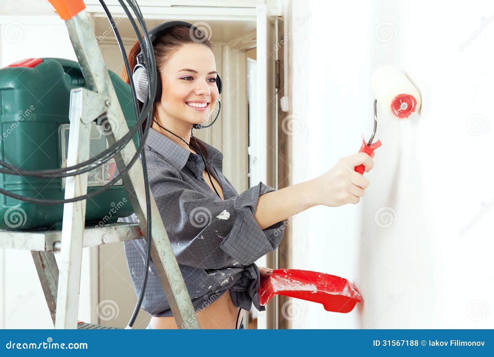 Happy Girl Makes Repairs at Home Stock Photo - Image of casual, paint ...