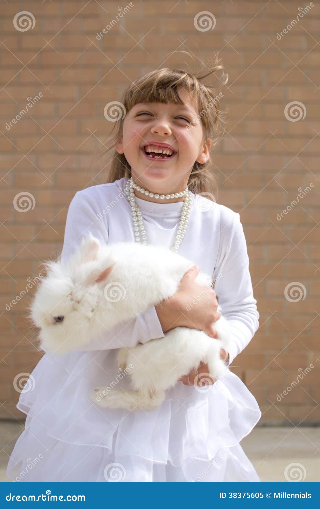 Happy girl with pet rabbit stock image. Image of happy - 38375605